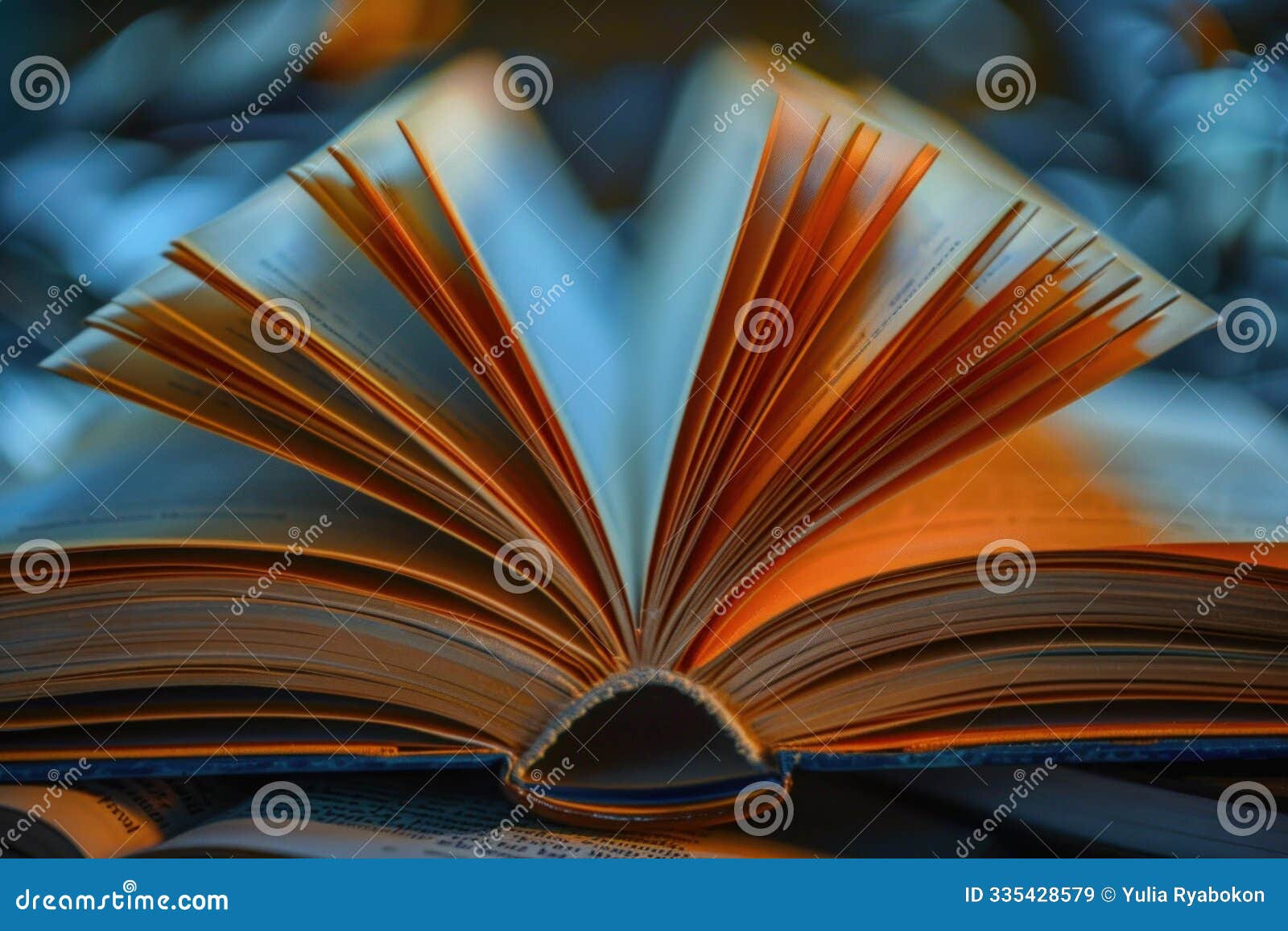 Open Book Spreading Its Colorful Pages on a Table Stock Image - Image ...