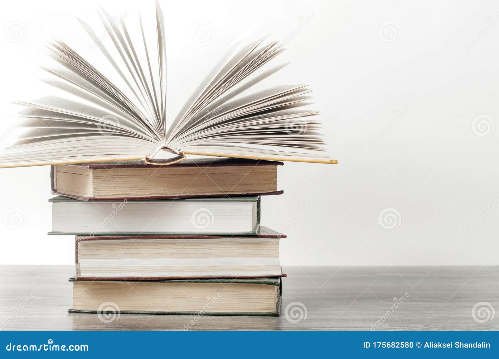 An Open Book on a Stack of Books. Stock Photo - Image of read, learn ...