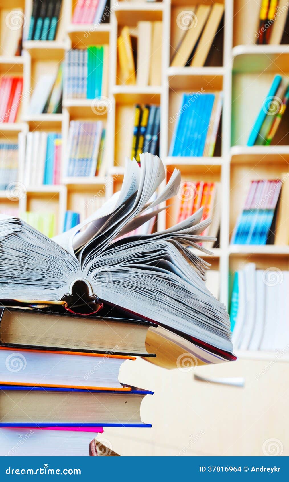 Open Book on a Stack of Books Stock Photo - Image of medium, library ...