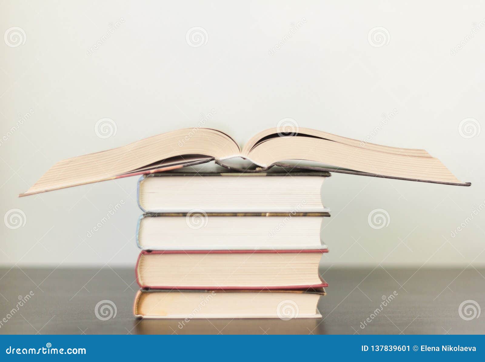 Open Book on a Stack of Books on the Table, Many Books Stock Image ...