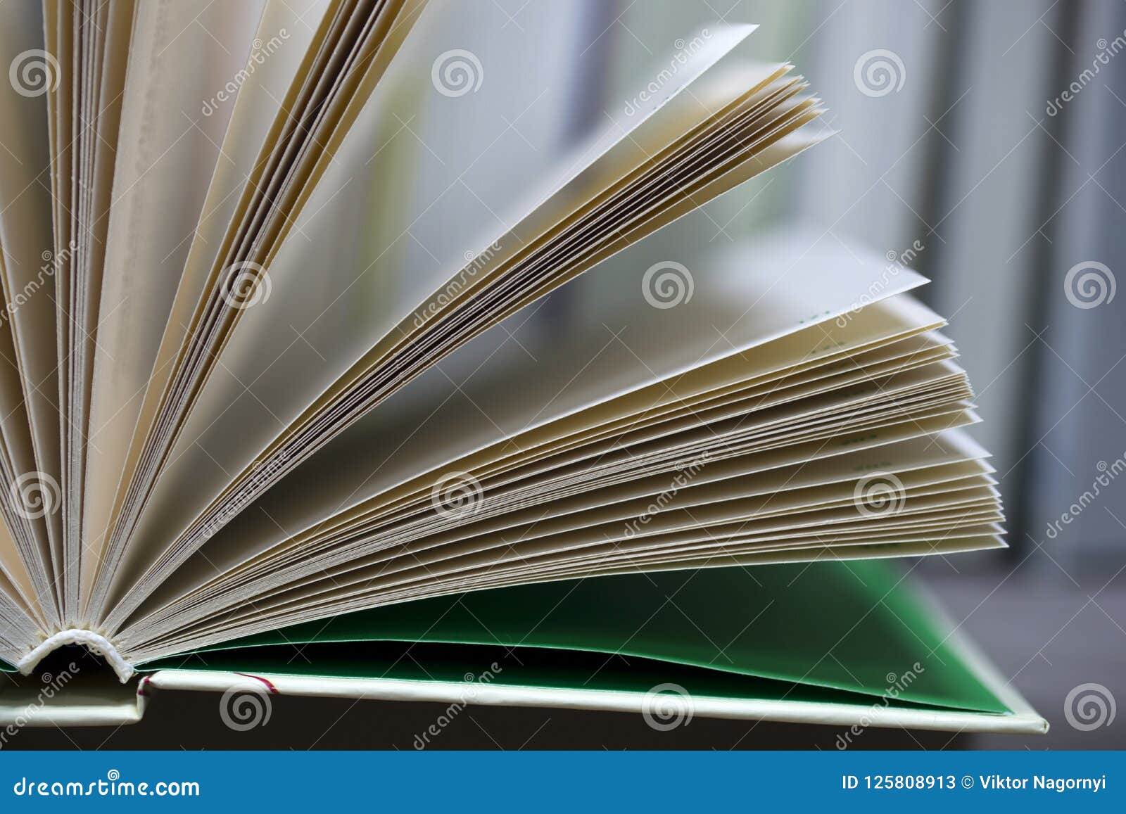 Open Book, Stack of Hardback Books on Table. Top View. Stock Image ...