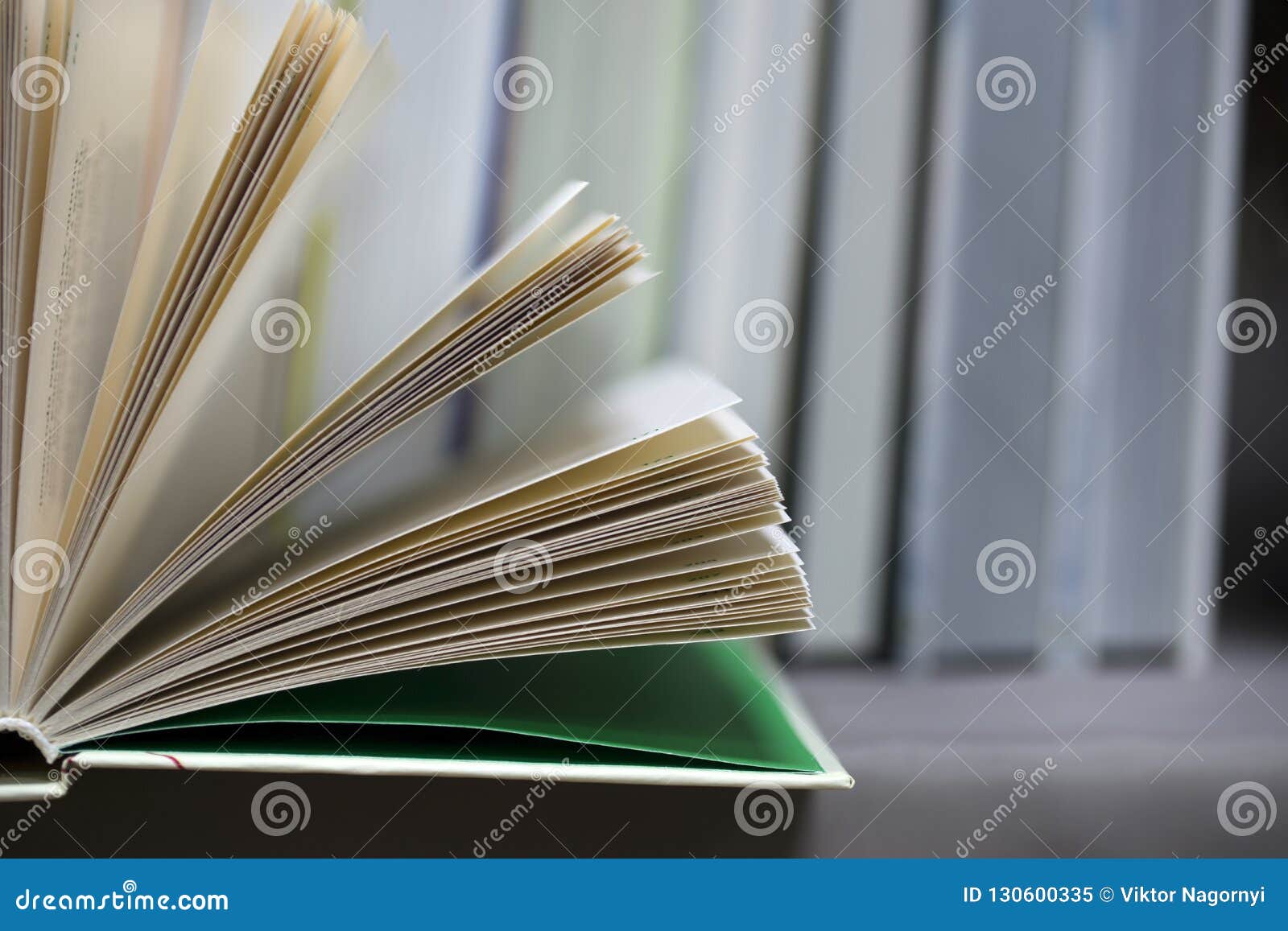 Open Book, Stack of Hardback Books on Table. Top View. Stock Image ...