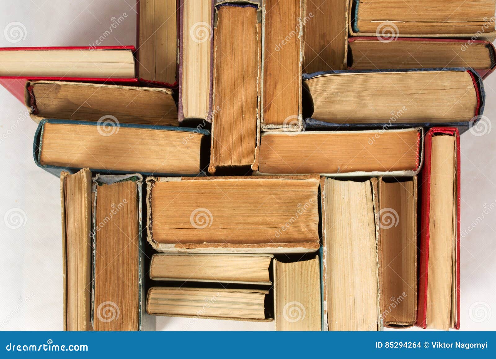Open Book, Stack of Hardback Books on Table. Top View. Stock Photo ...