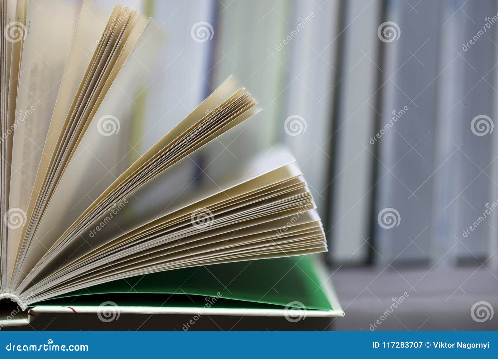 Open Book, Stack of Hardback Books on Table. Top View. Stock Image ...