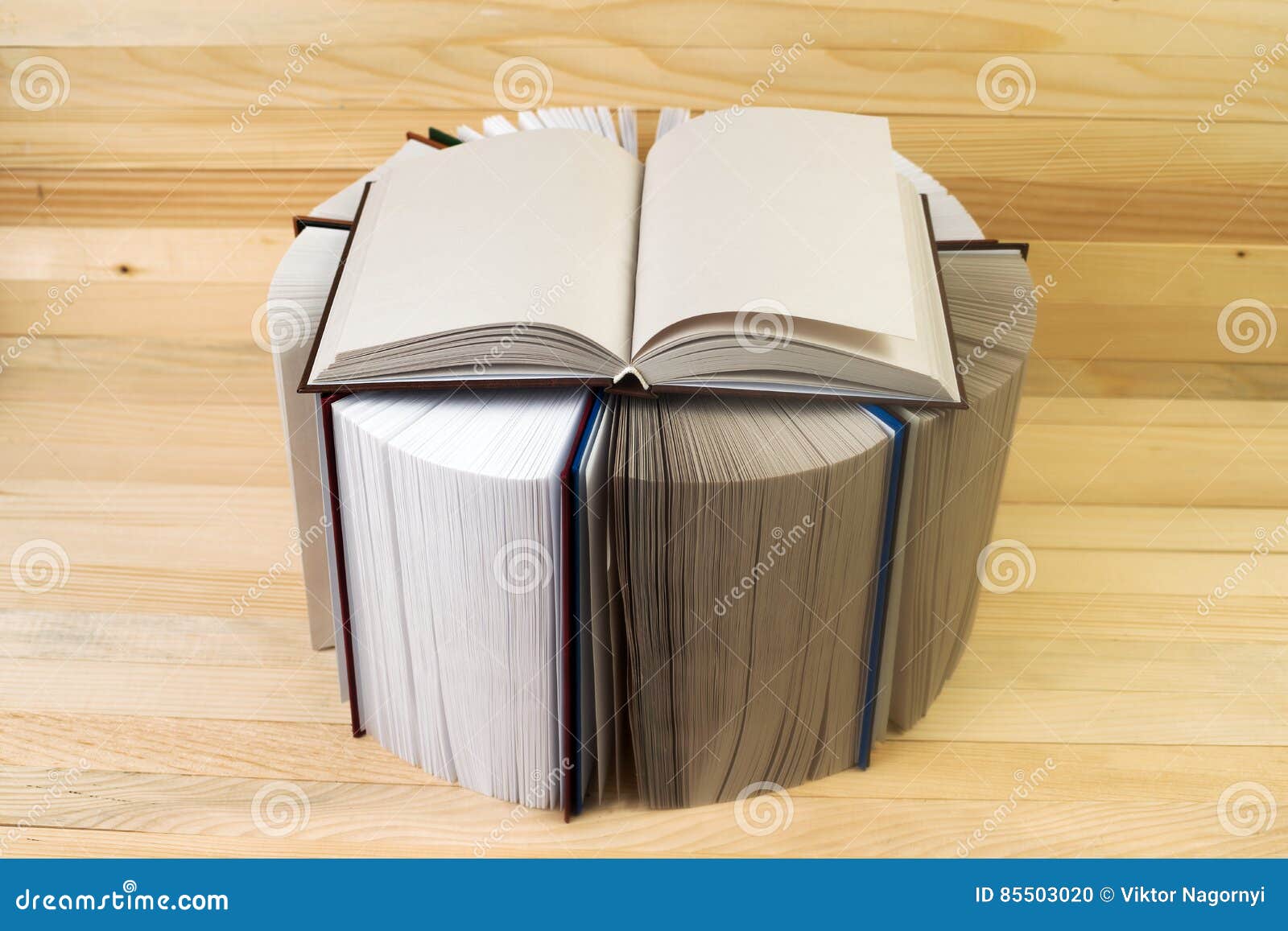 Open Book, Stack of Hardback Books on Wooden Table. Stock Photo - Image ...