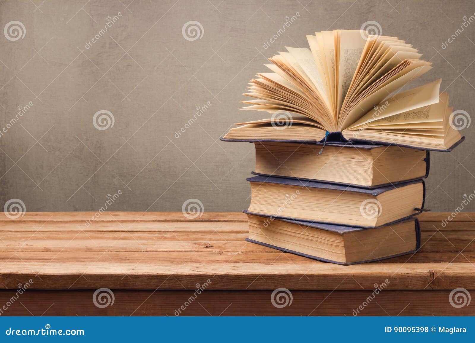 Open Book and Stack of Old Books on Wooden Table Stock Photo - Image of ...