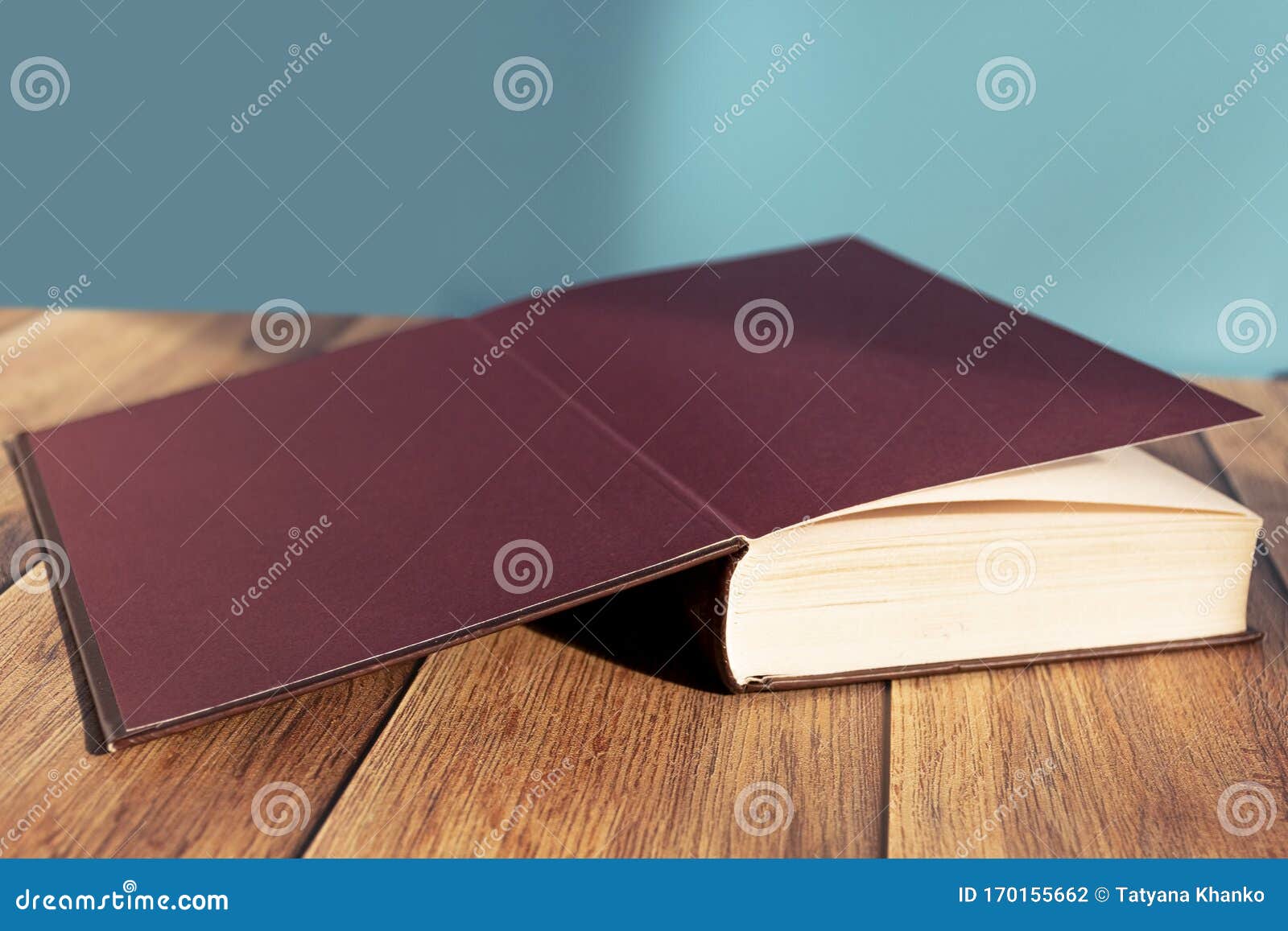 Open Book on the Table. a Stack of Old Books with Yellow Pages. Book ...