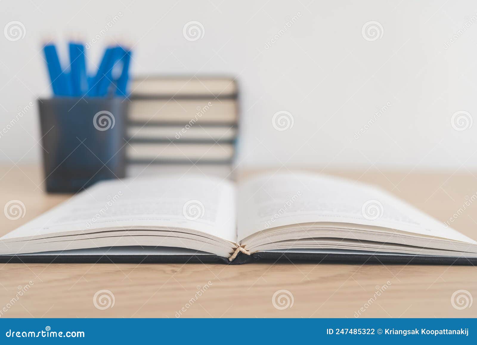 Open Book and Stack of Textbook on Table. Business Success Idea of ...