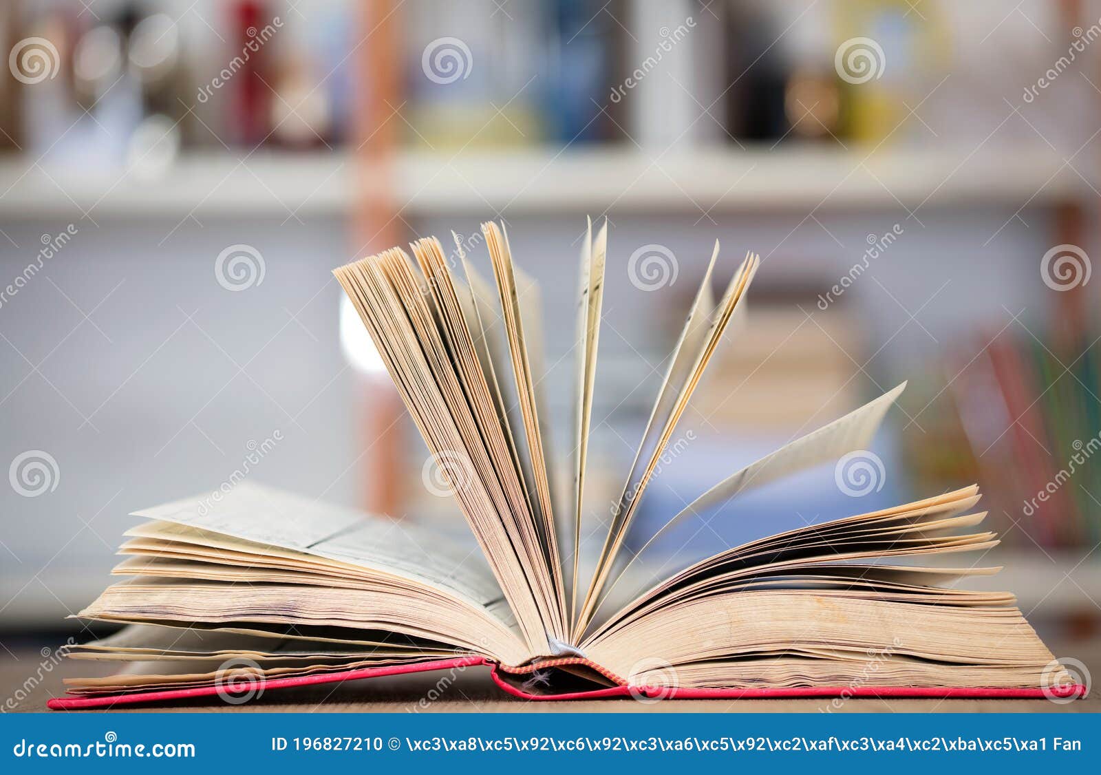 An open book on table stock photo. Image of yellowing - 196827210