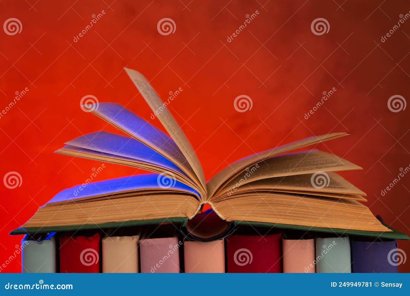 Open Book on the Table. Education and Reading Concept. Retro Neon Light ...