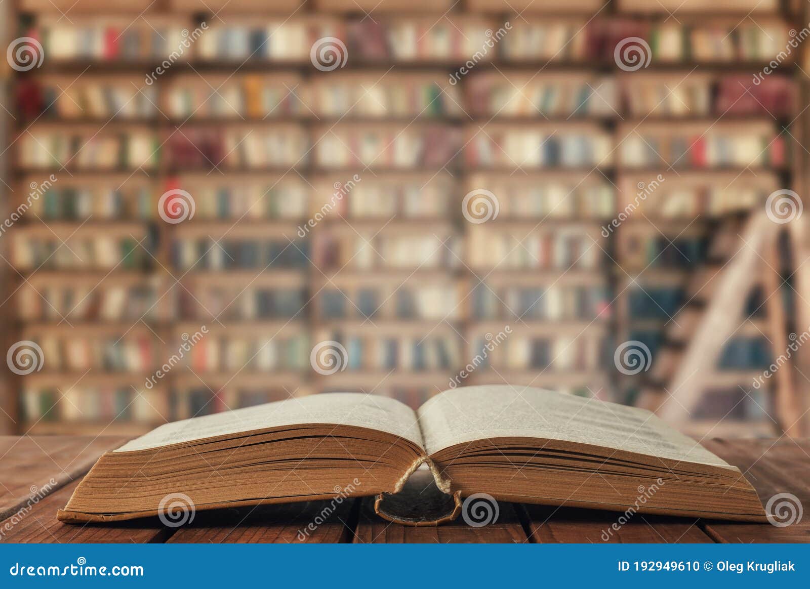 Open Book on the Table in the Library Stock Photo - Image of interior ...