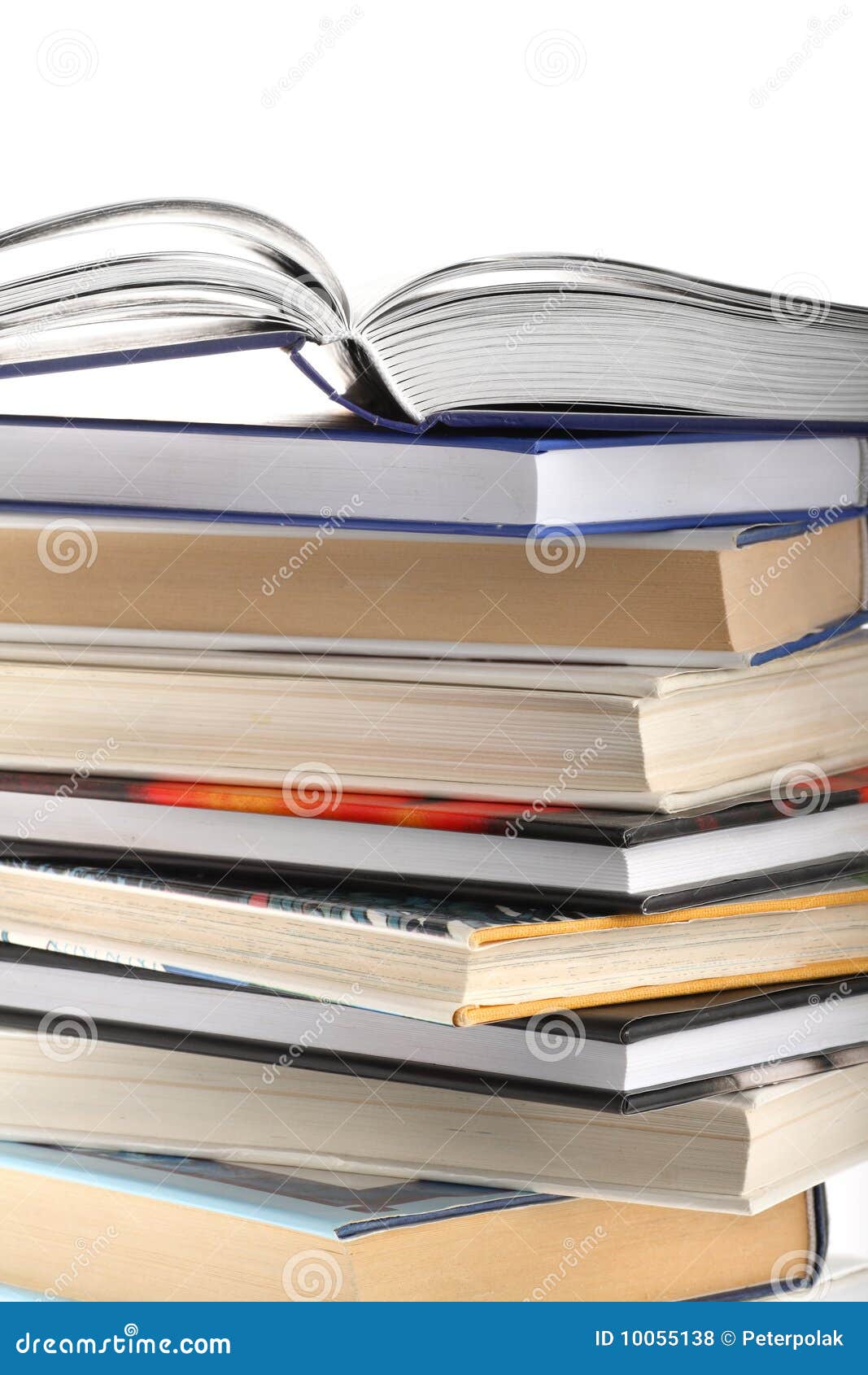 Open Book on Top of Book Stack Isolated on White Stock Photo - Image of ...