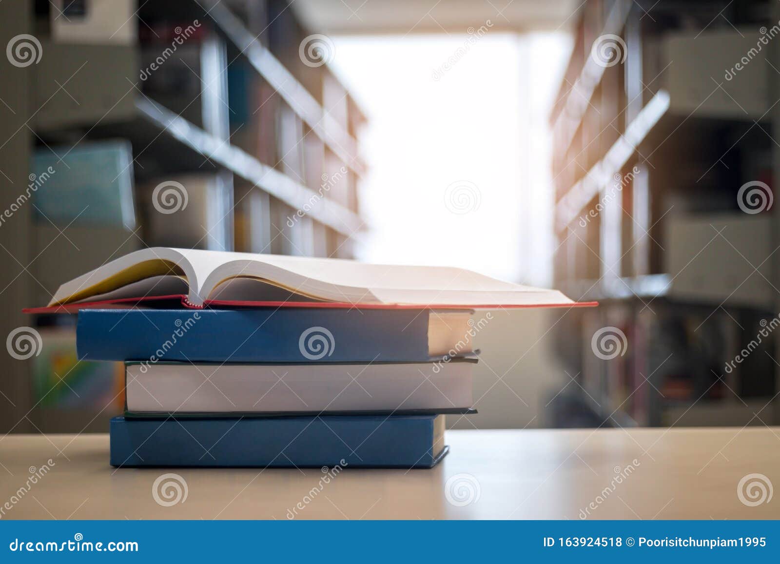 Open Book on Wood Desk in Library. Stock Photo - Image of modern, book ...