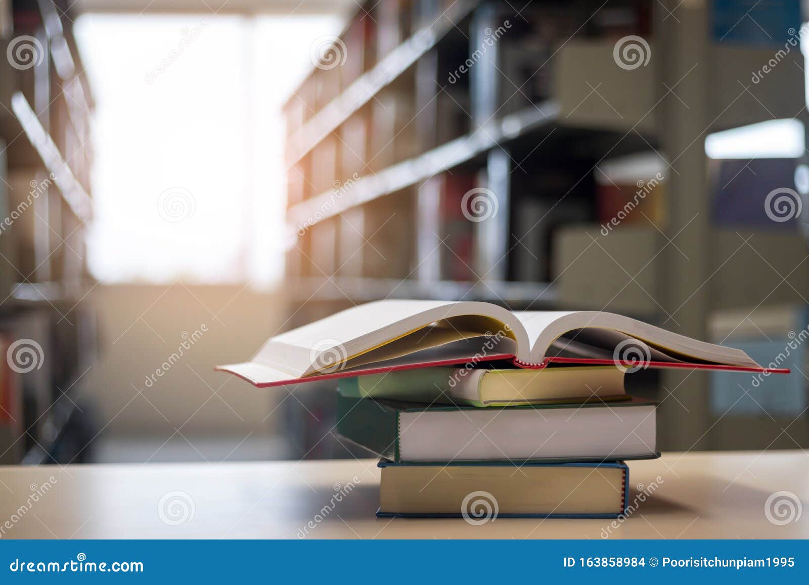 Open Book on Wood Desk in Library. Stock Photo - Image of novel ...