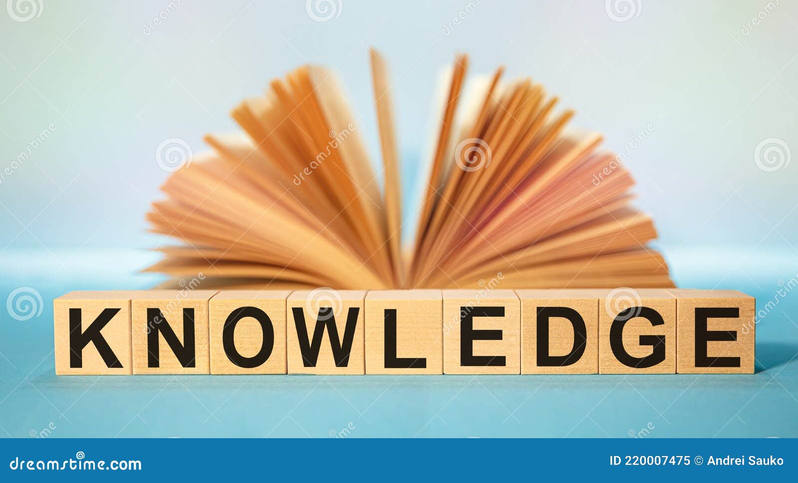 Open Book and Wooden Cubes with the Abbreviation Knowledge Stock Image ...