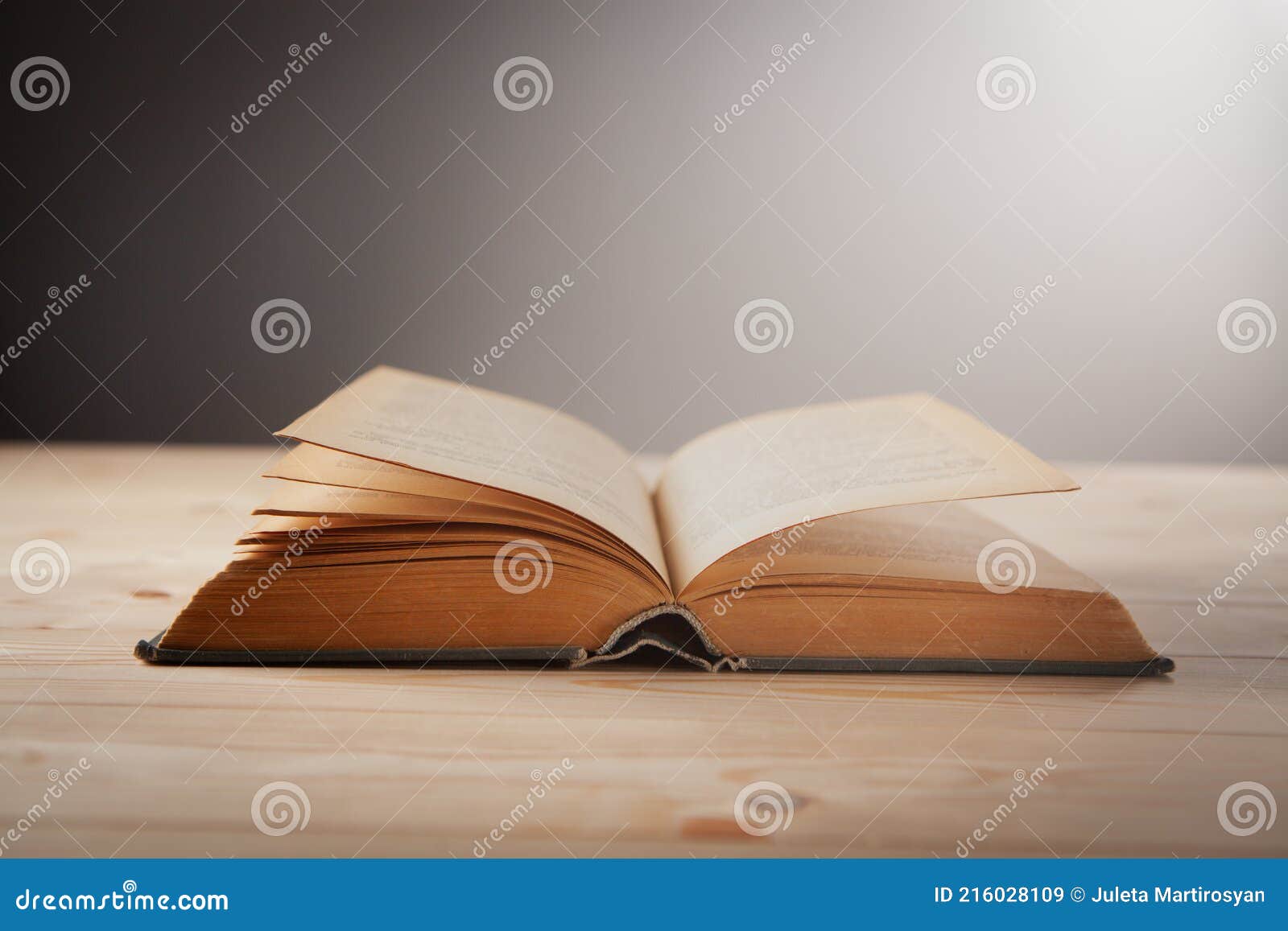 Open book on the table stock image. Image of background - 216028109
