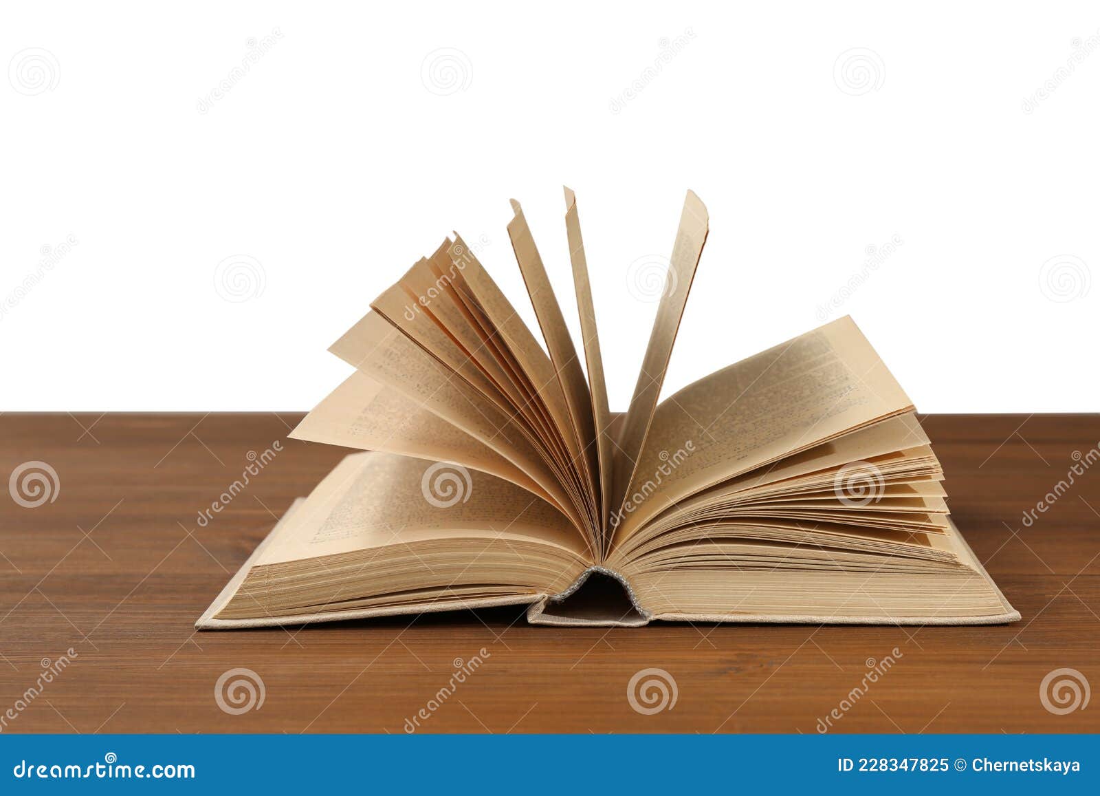 Open Book on Wooden Table Against White Background. Library Material ...