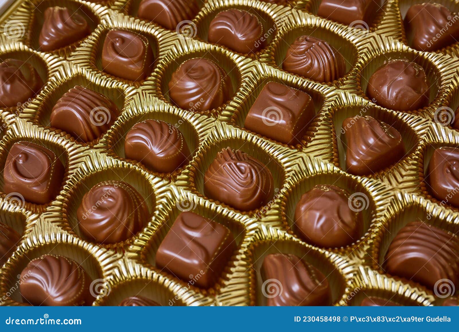 Open Box of Chocolate Treets Stock Photo - Image of sweet, pattern ...