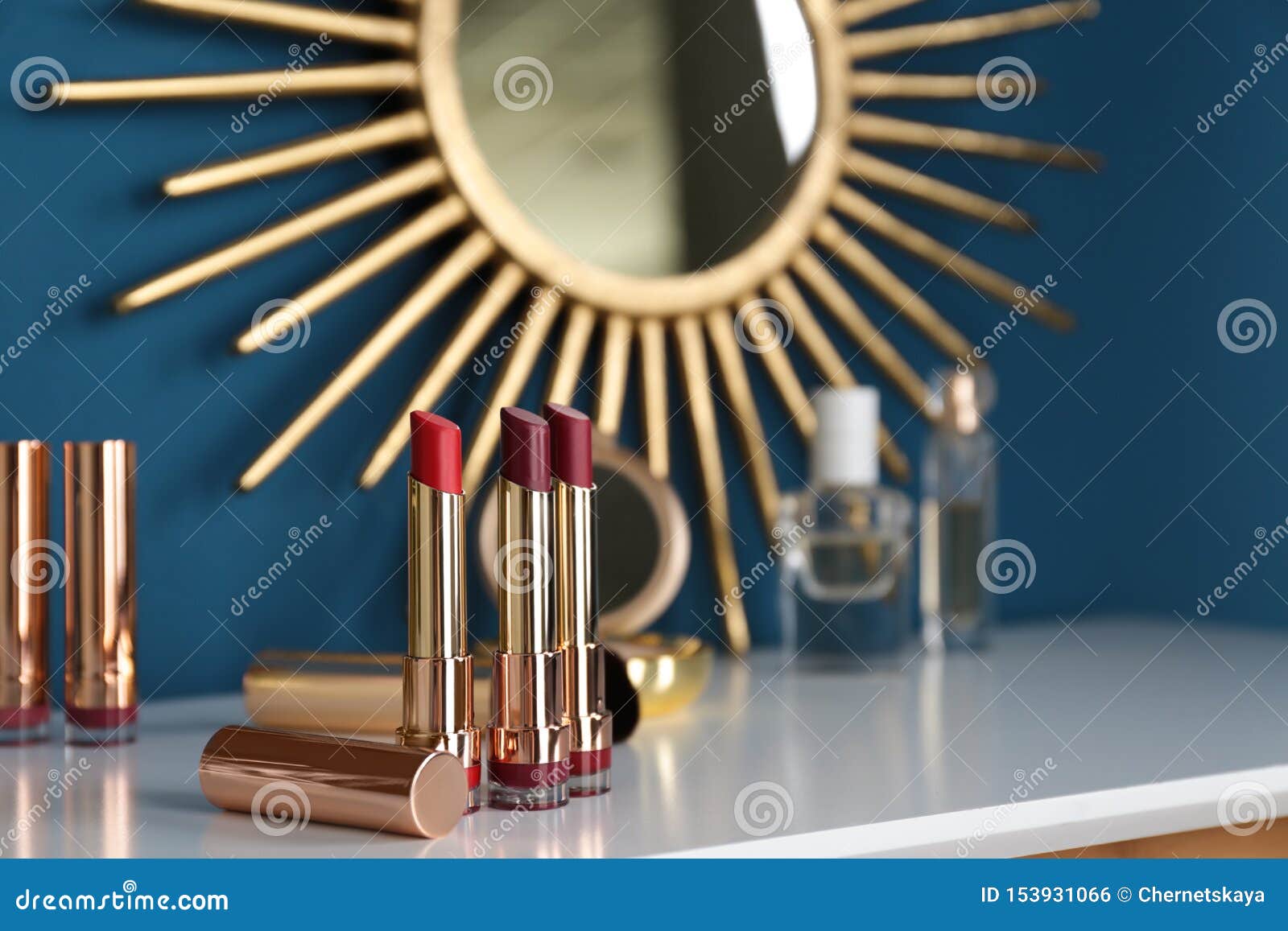 Open Bright Lipsticks on Dressing Table Stock Photo - Image of ...