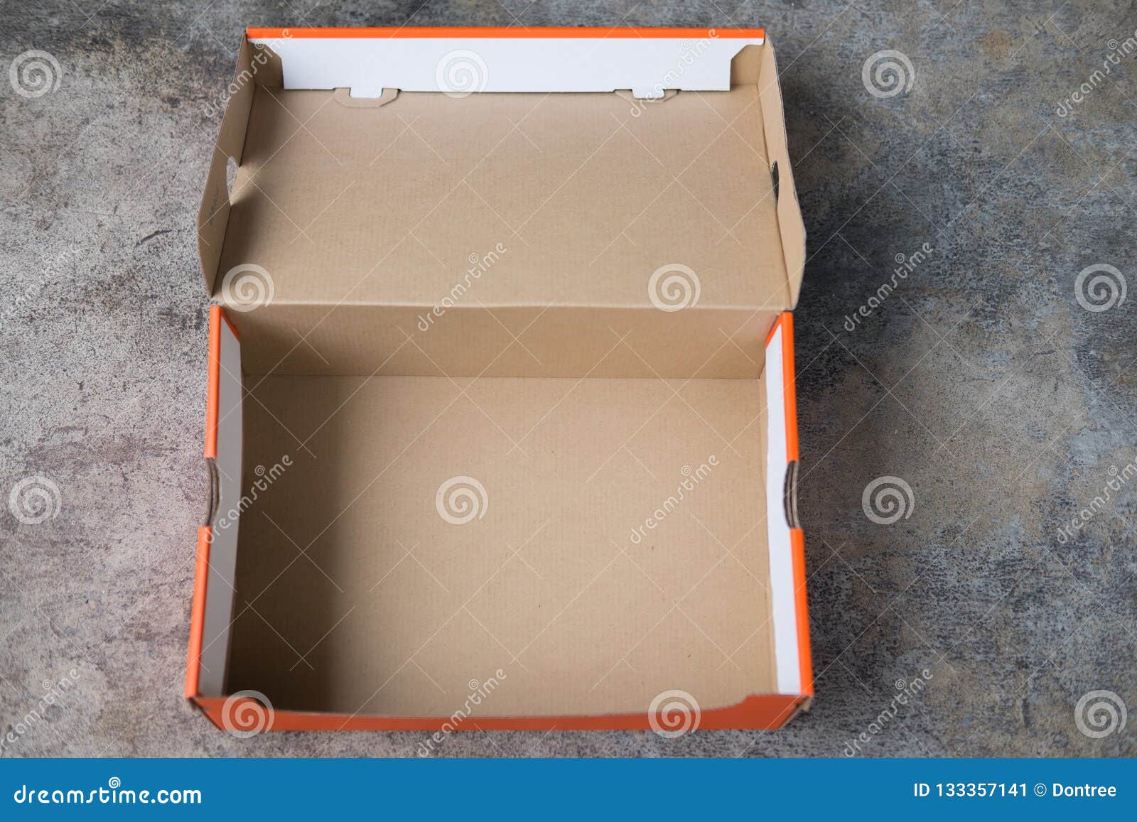 Open Brown and Orange Cardboard Box Stock Image - Image of store, boots ...