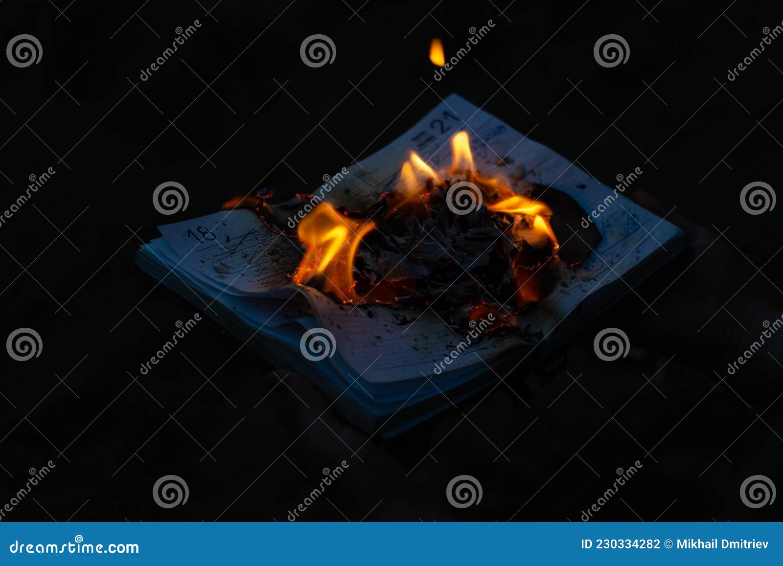 Open Burning Diary on Black Background. Notebook with Flame Cove Stock ...