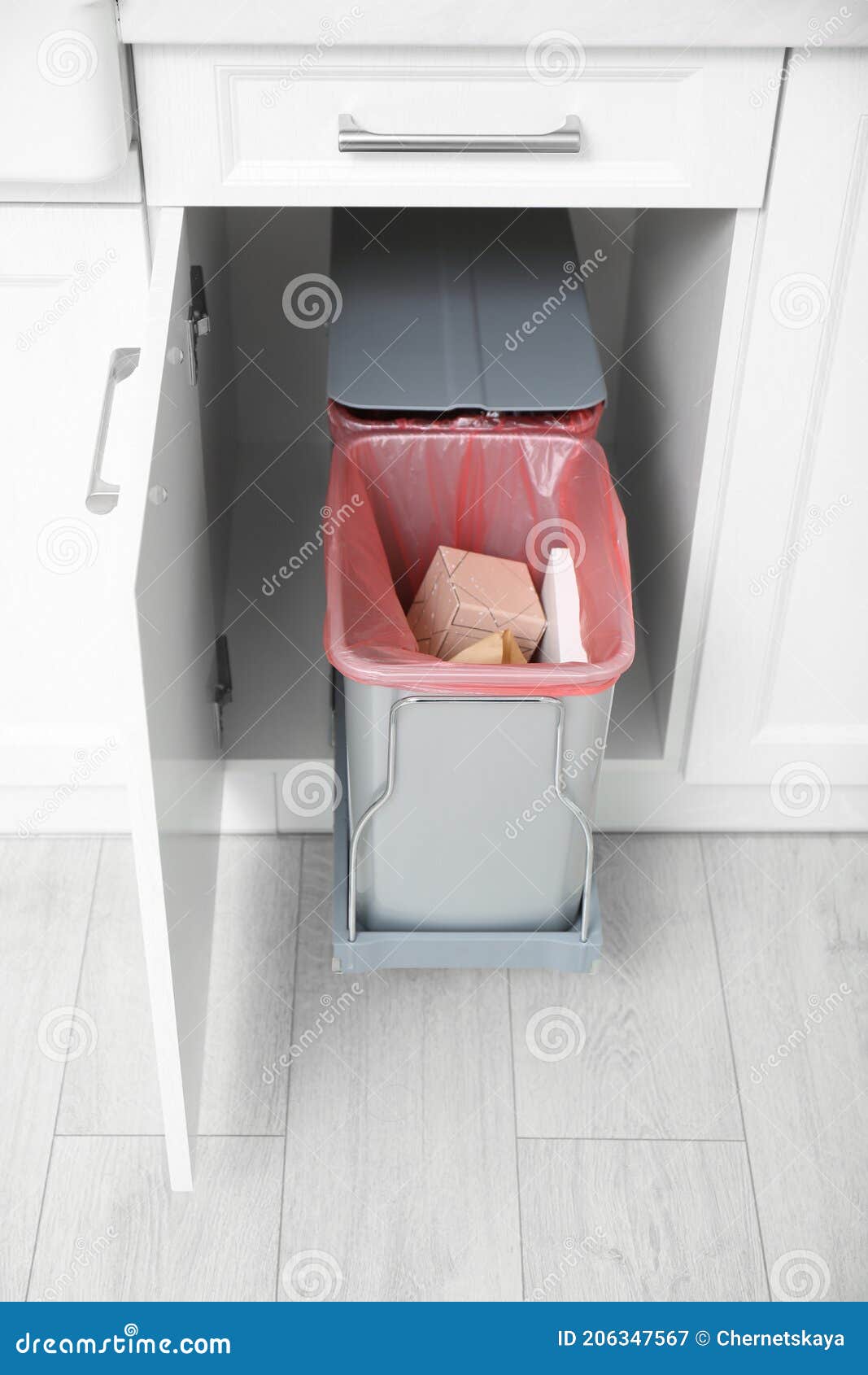 Open Cabinet with Full Trash Bin in Kitchen Stock Image - Image of ...