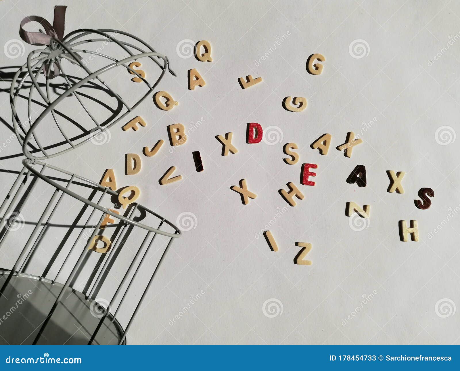 Open Cage and Scattered Letters with Ideas Written Stock Image - Image ...