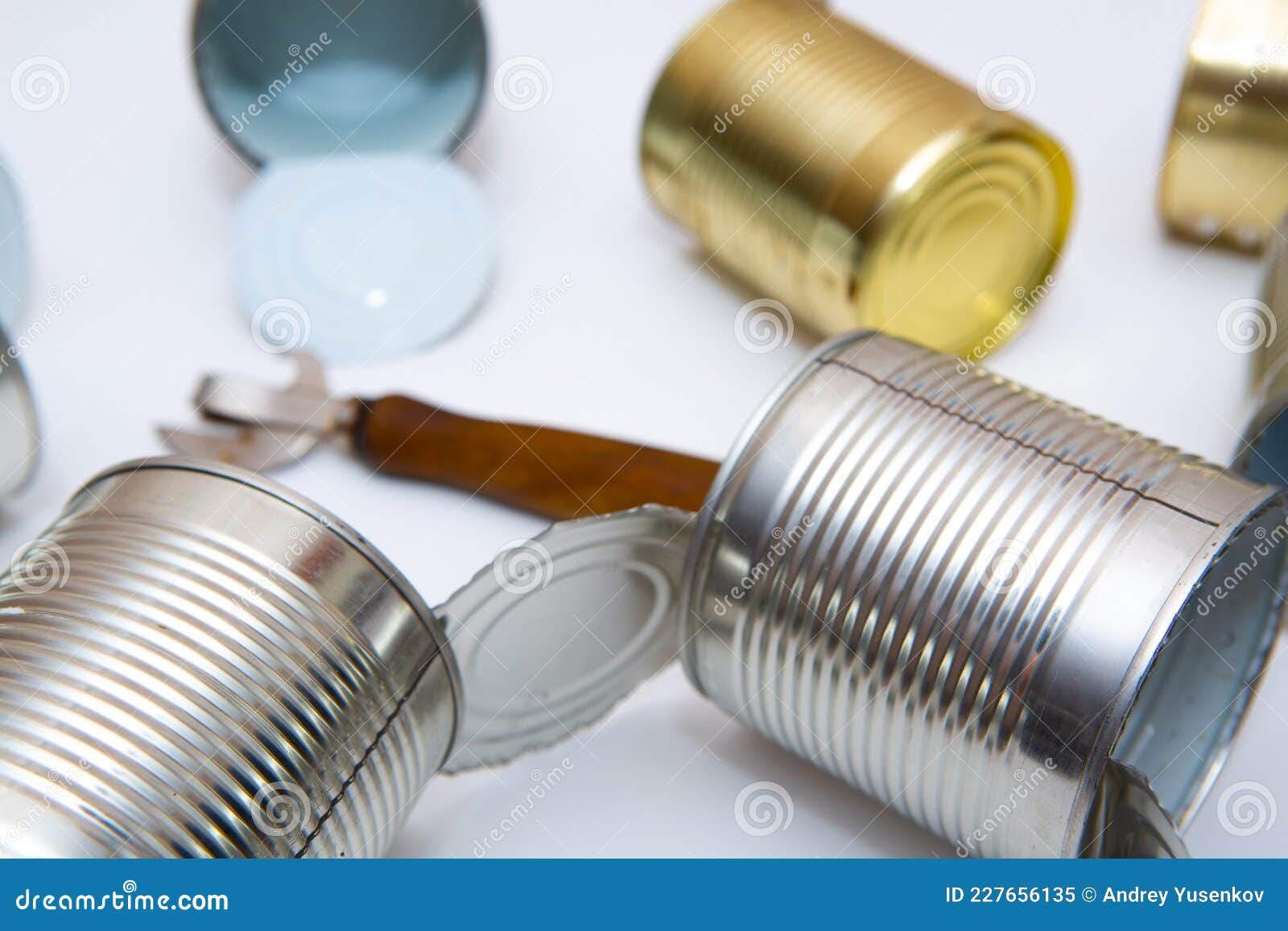 Open cans and a can opener stock image. Image of metallic - 227656135