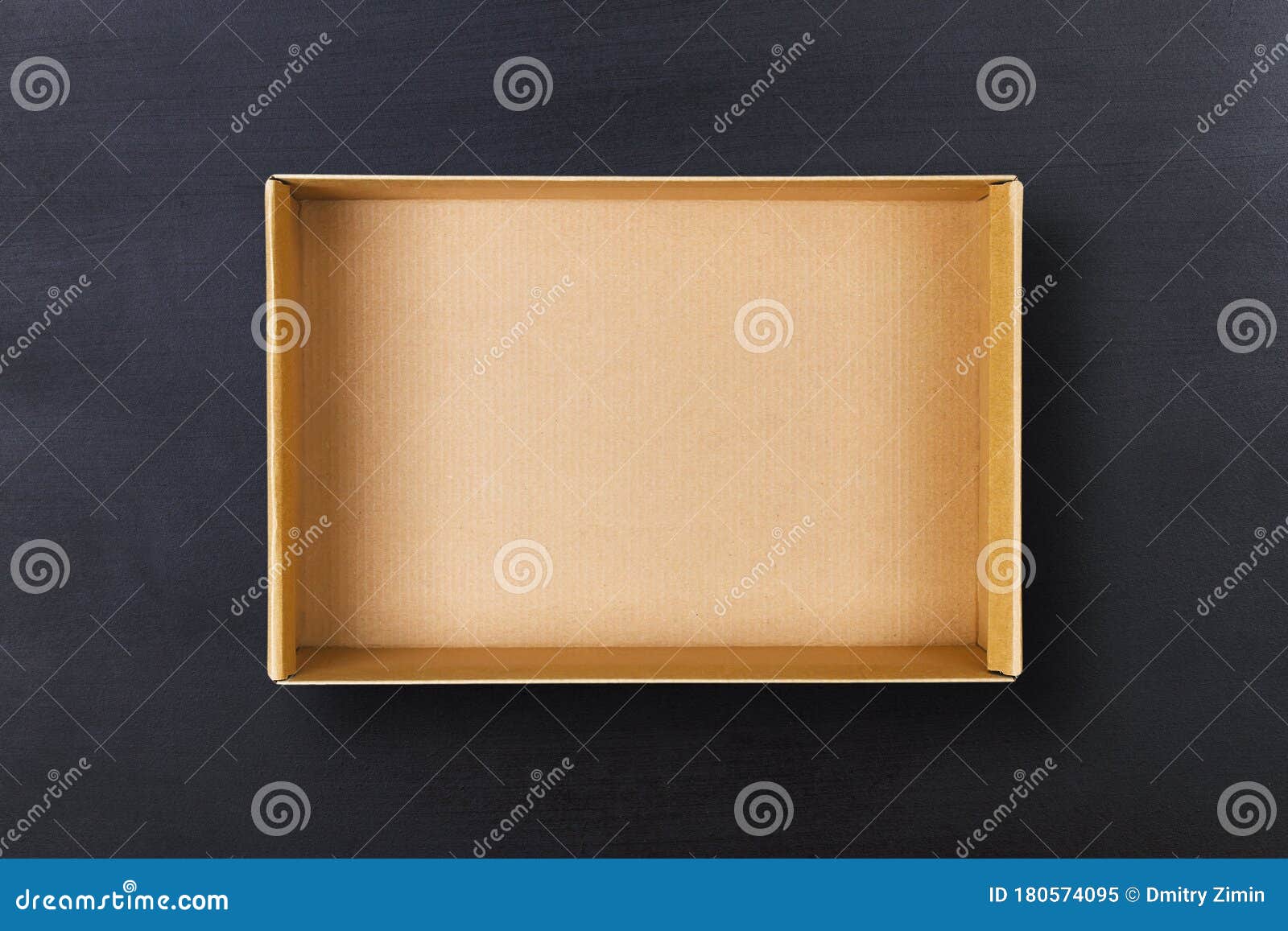 Open Cardboard Box on Chalkboard Background. Empty Cardboard Package on ...
