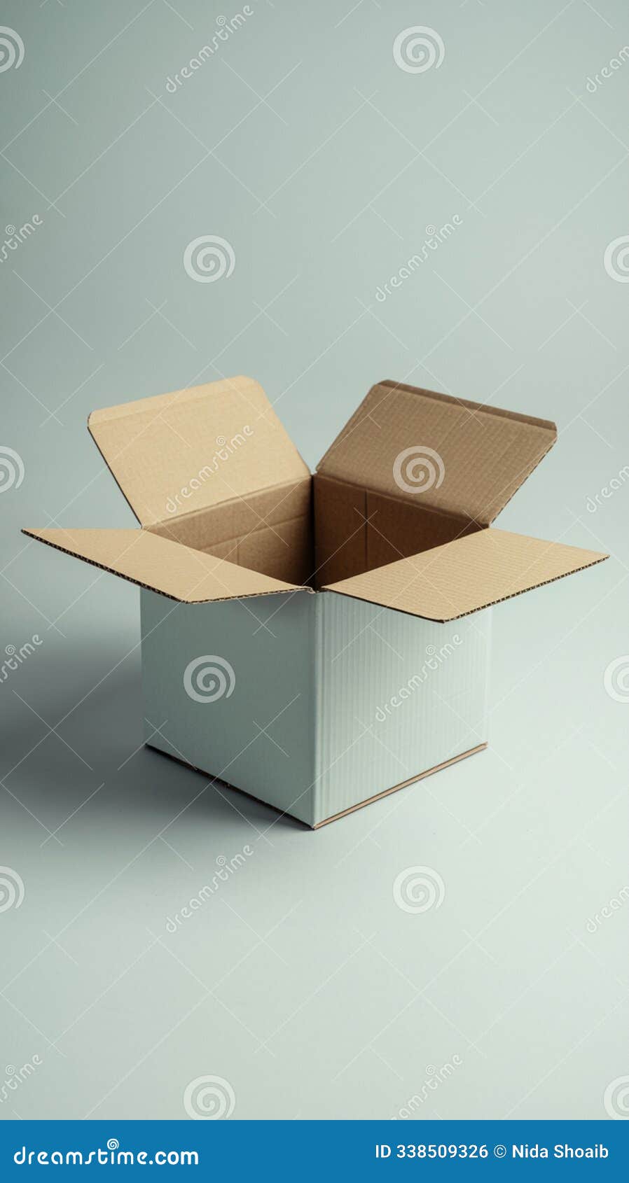 Open Cardboard Box with Four Flaps, Light Gray Surface, Empty ... Open Cardboard Box with Four Flaps, Light Gray Surface, Empty ...