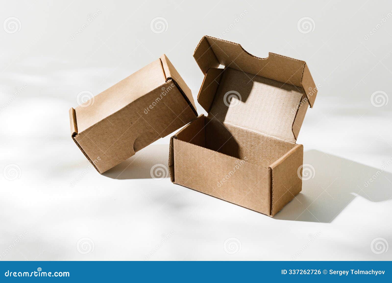Open Cardboard Box on a Reflective Surface with Soft Shadows Stock ...