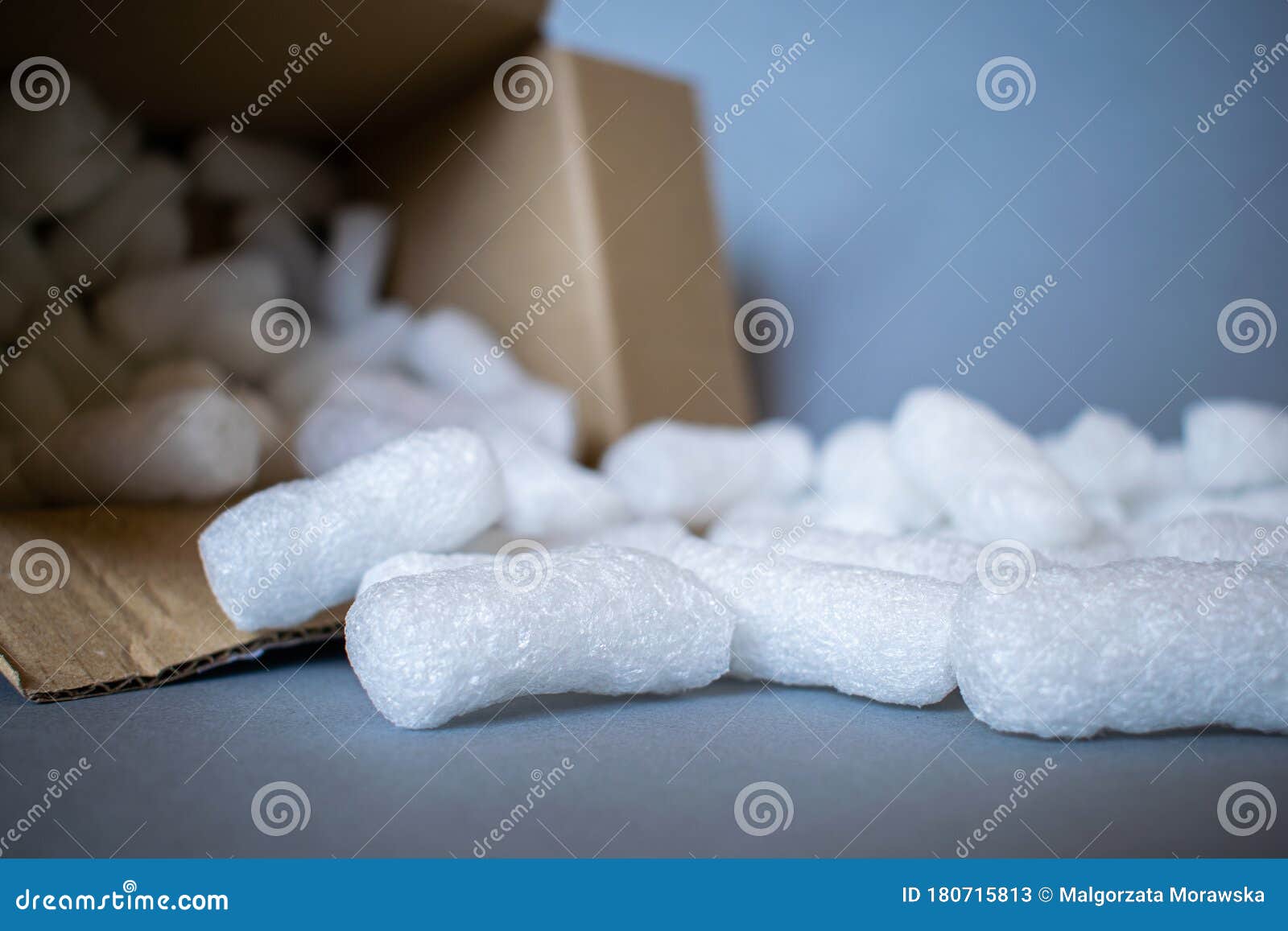 Open Cardboard Box with White Styrofoam Filling Pieces Comming Out ...