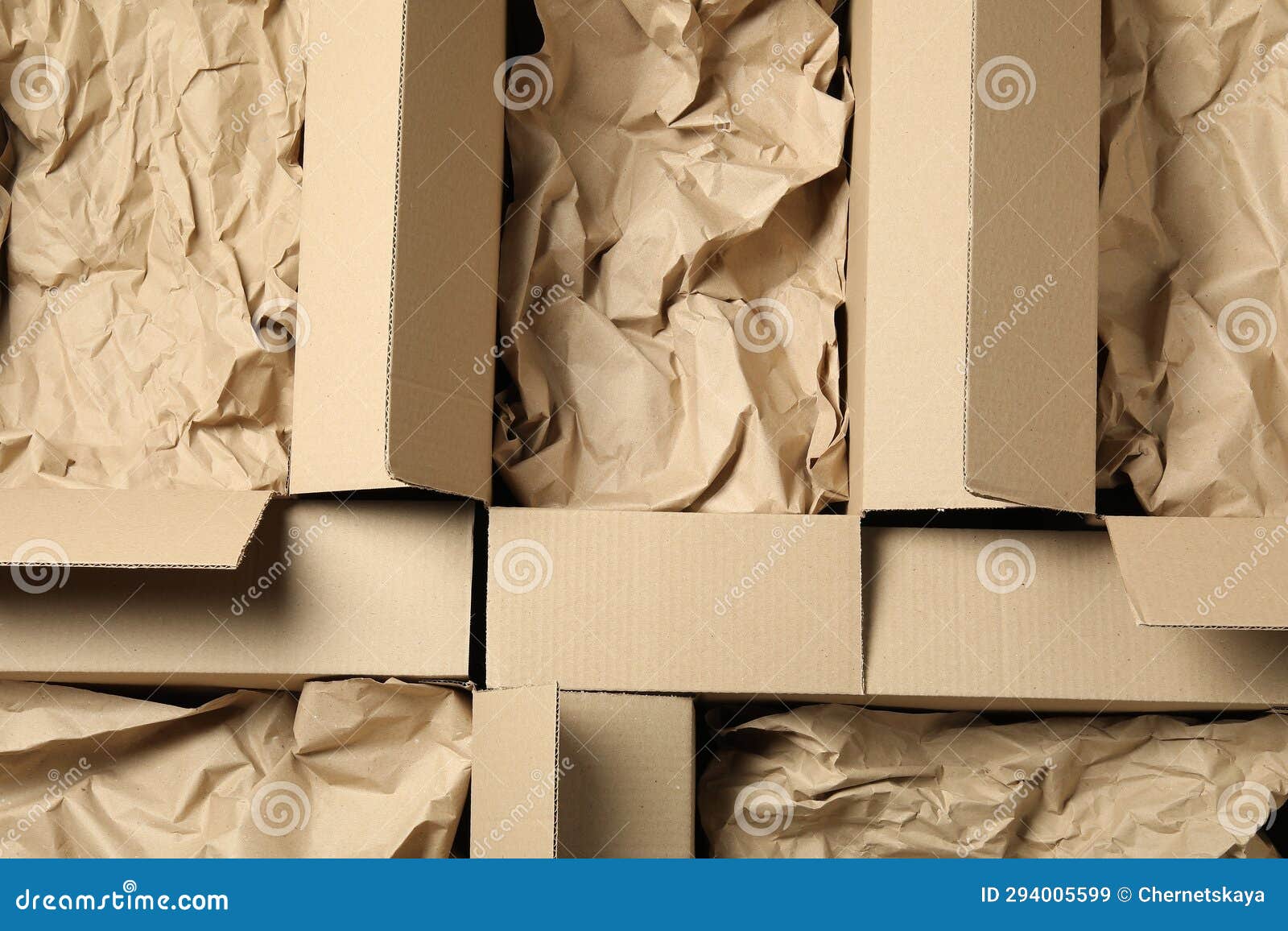 Open Cardboard Boxes with Crumpled Paper, Top View. Packaging Goods ...