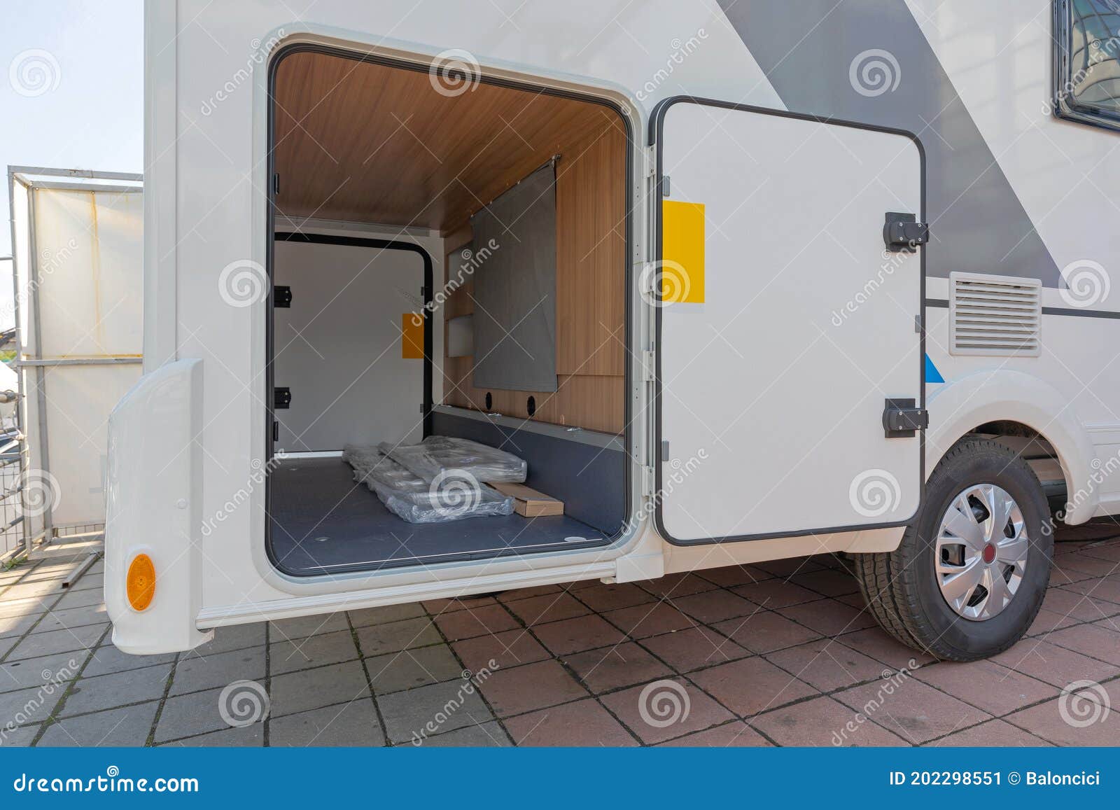 Open Cargo Door Camper stock image. Image of exterior - 202298551