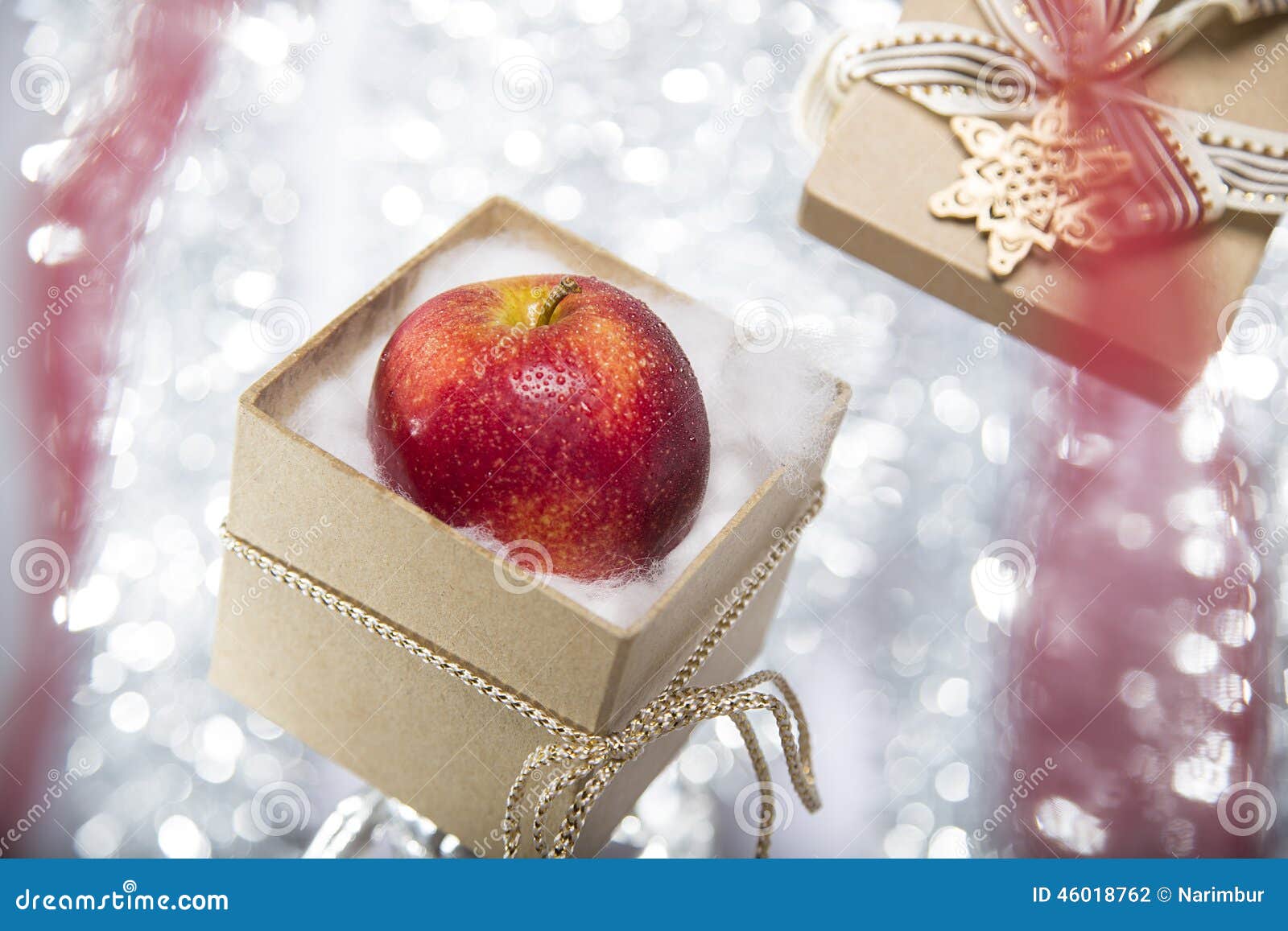 Open Christmas Gift Box with an Apple Stock Photo - Image of gifts ...