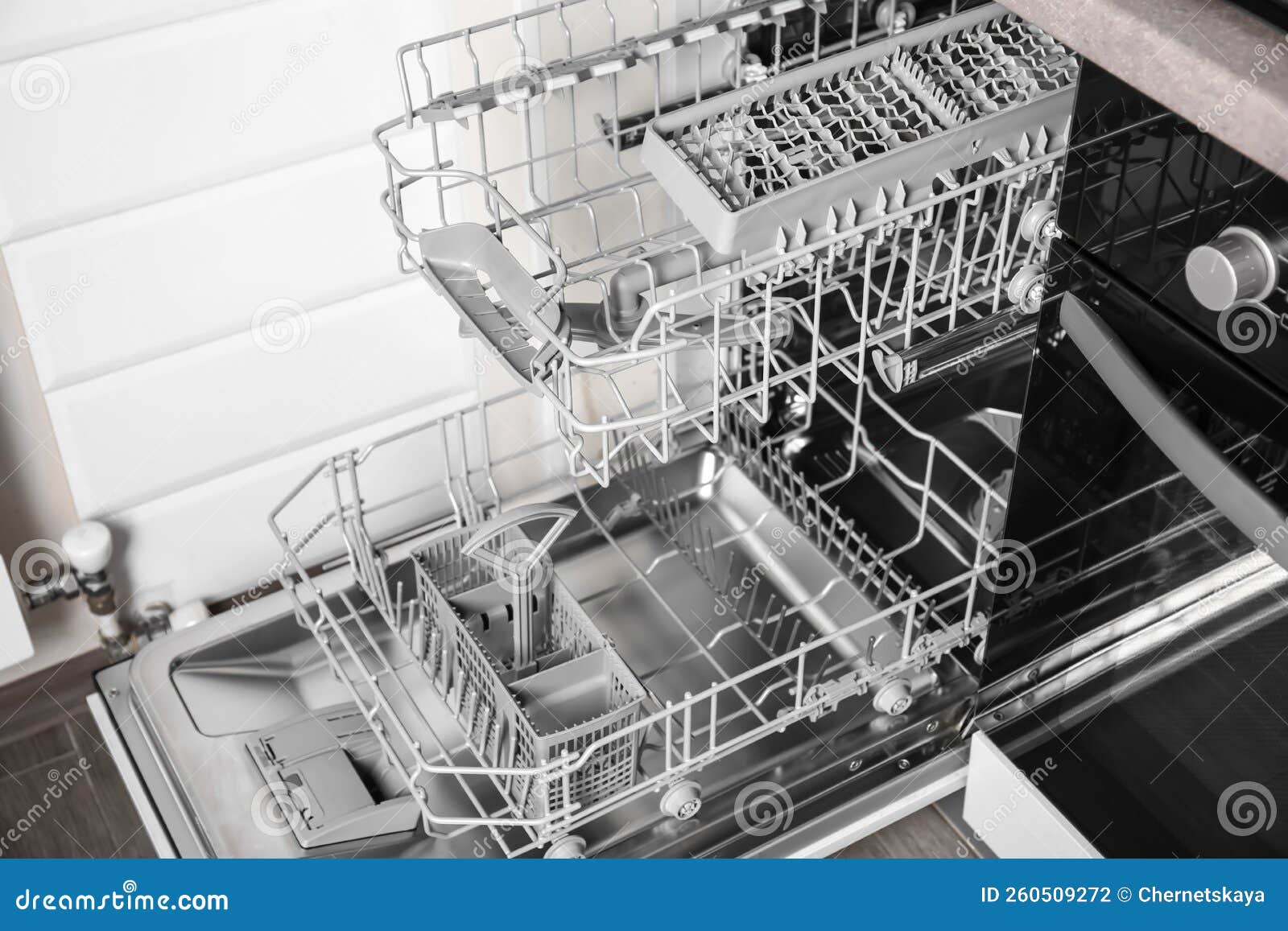 Open Clean Empty Dishwasher in Kitchen, Closeup Stock Photo - Image of ...