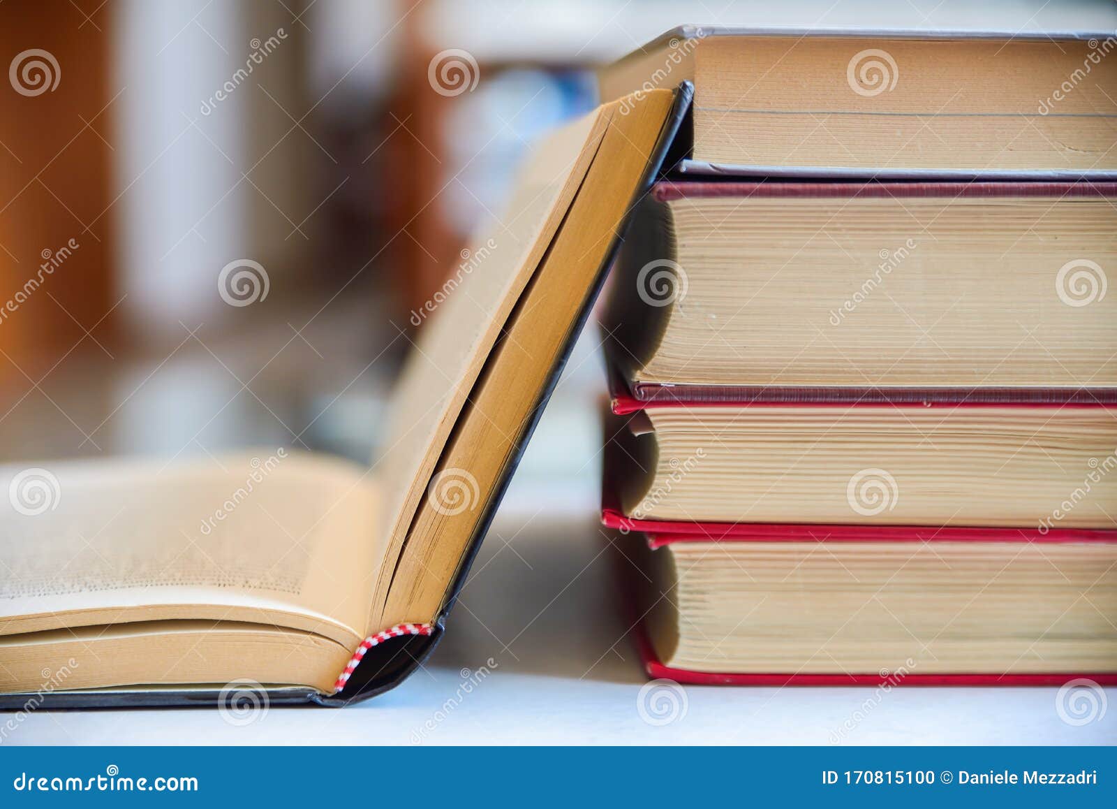 Open and Closed Books on a Table Stock Photo - Image of books, exams ...