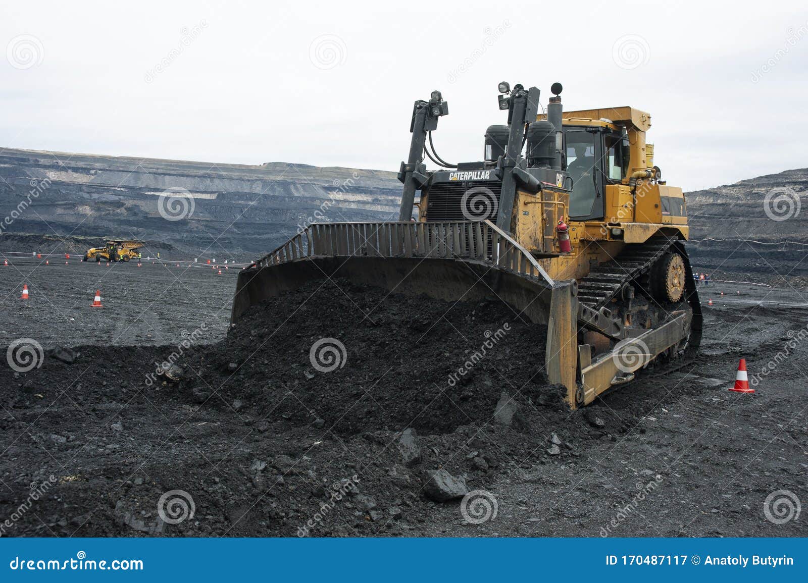 Extraction of Minerals. Heavy Powerful Bulldozer in the Quarry ...
