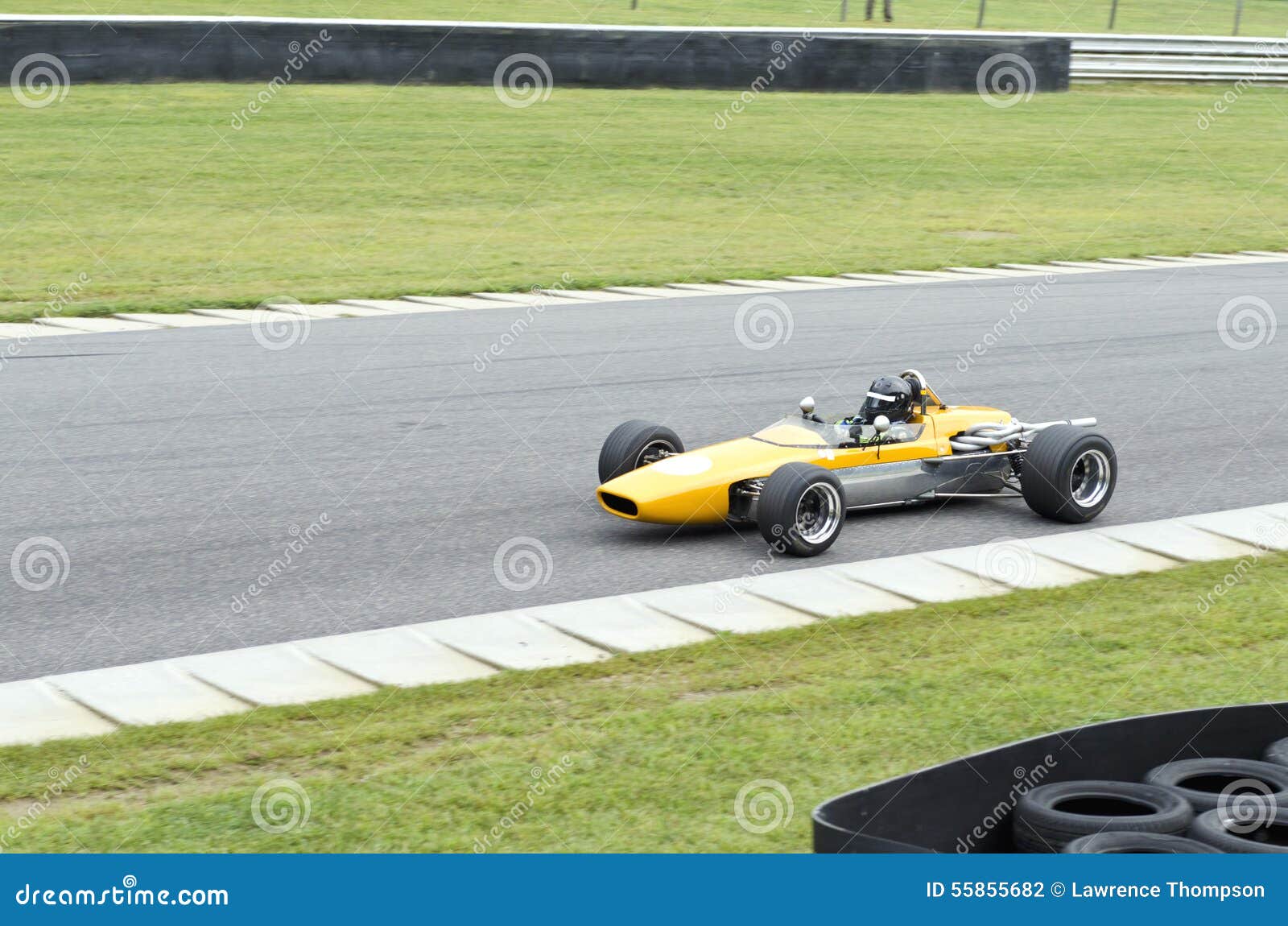 Open Cockpit Yellow Racing Car Driving on Track Stock Photo - Image of ...
