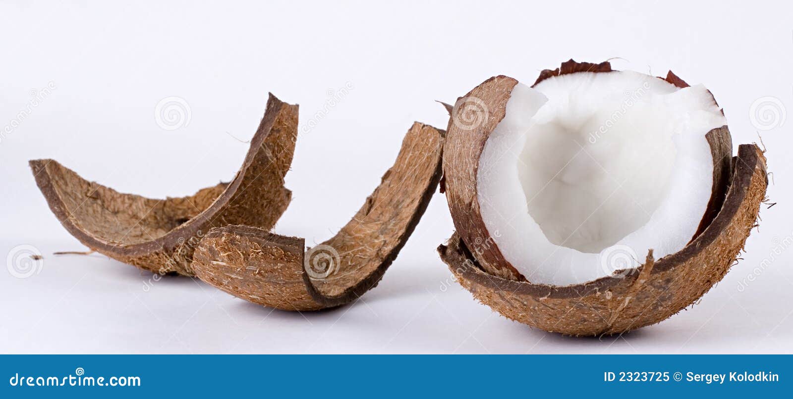 Open Coconut Cream In Glass Jar With Fresh Coconut Split In Half On ...