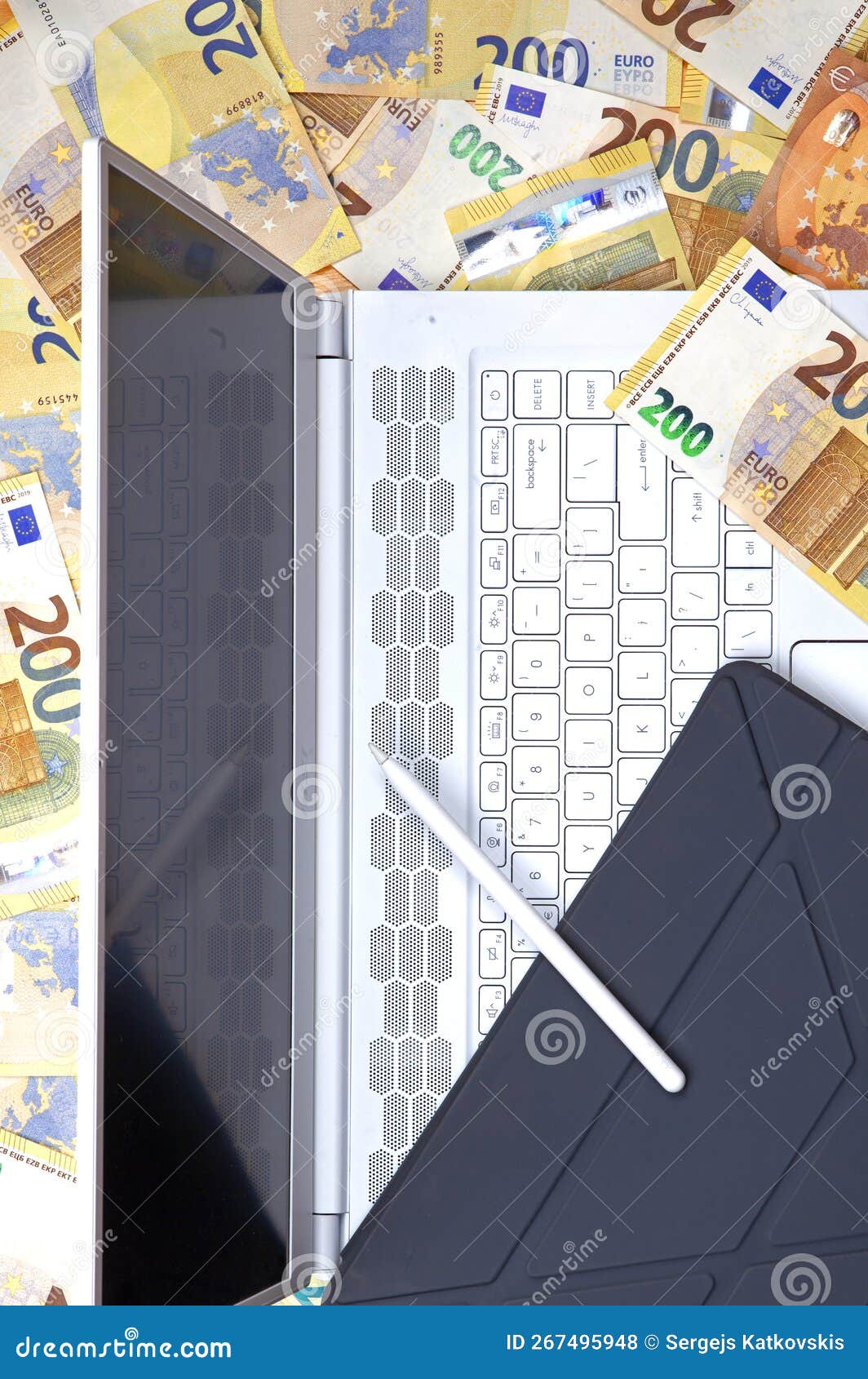 Open Computer and a Lot of Money Around Stock Photo - Image of bill ...