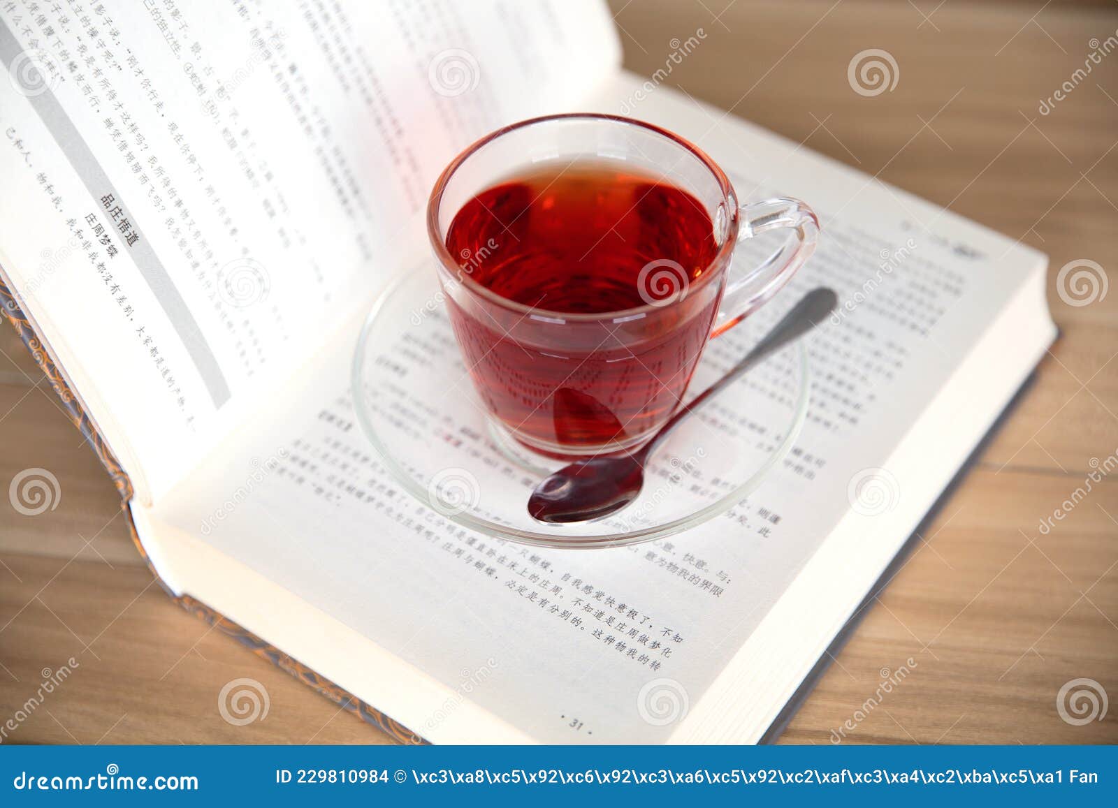 Open a Cup of Black Tea on the Book Stock Photo - Image of objects ...