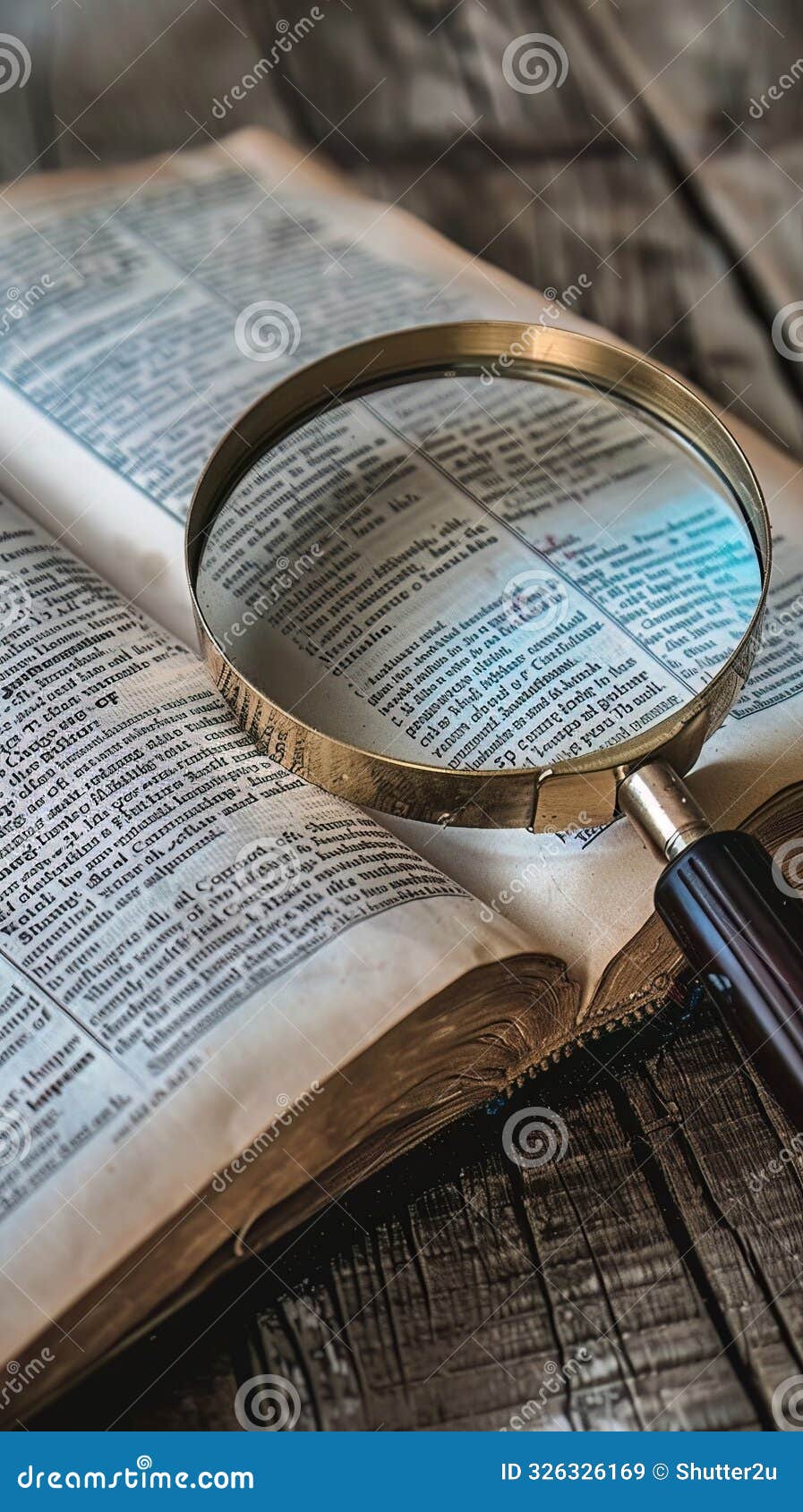 An Open Dictionary with a Magnifying Glass Hovering Over a Word ...