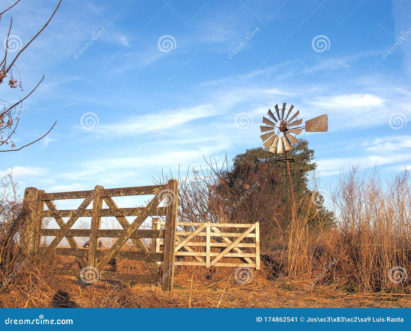 Agricultural Field Gates, the Old Windmill To Extract Water Stock Image ...