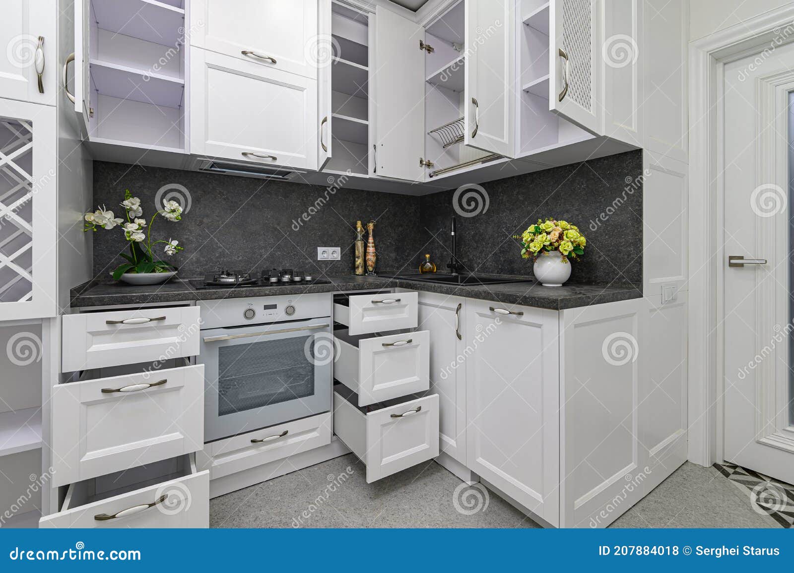 Open Doors and Drawers Open at Modern White Kitchen Stock Photo - Image ...