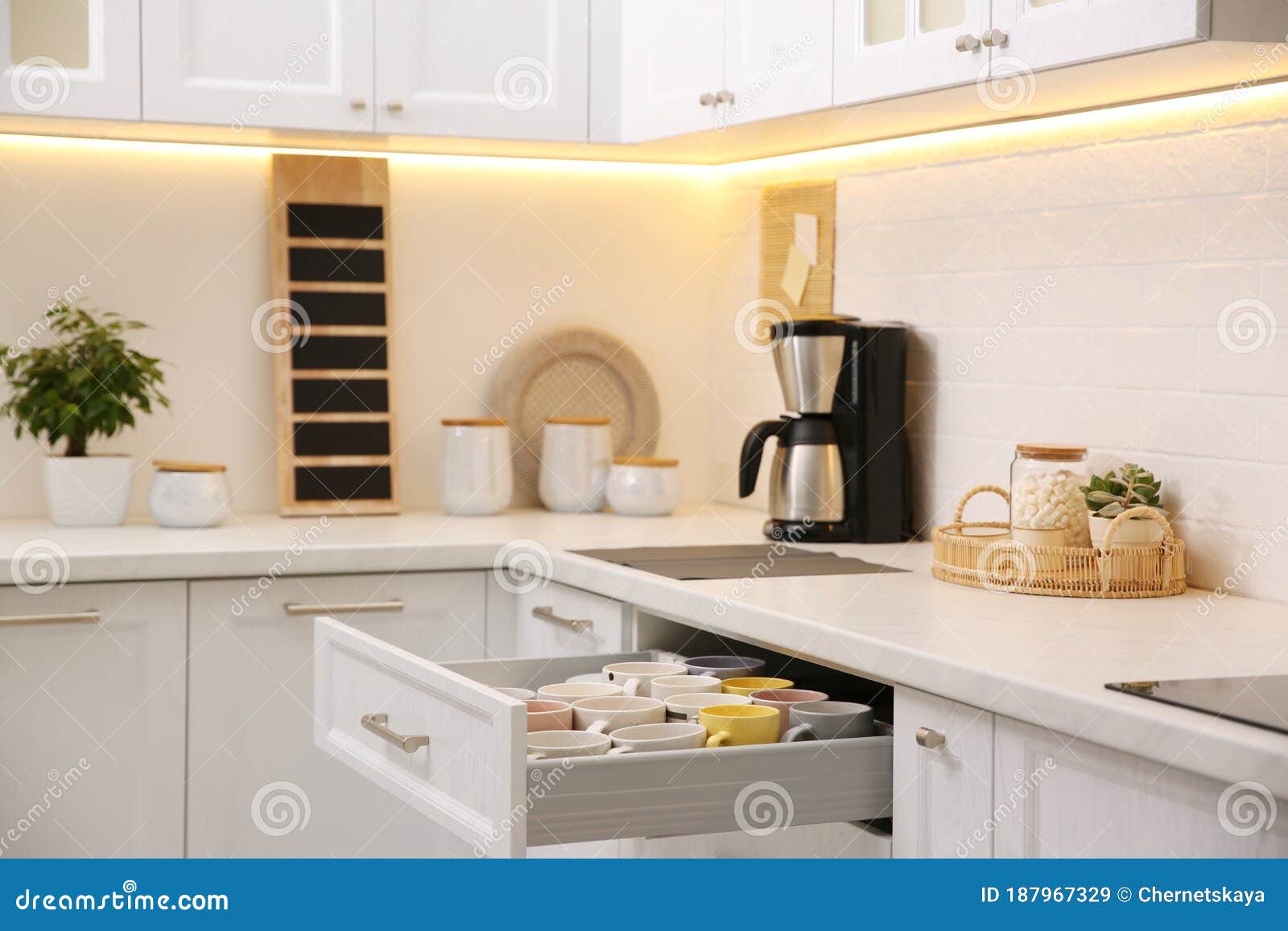 Drawer with Cups and Coffeemaker on Countertop in Kitchen Stock Image ...