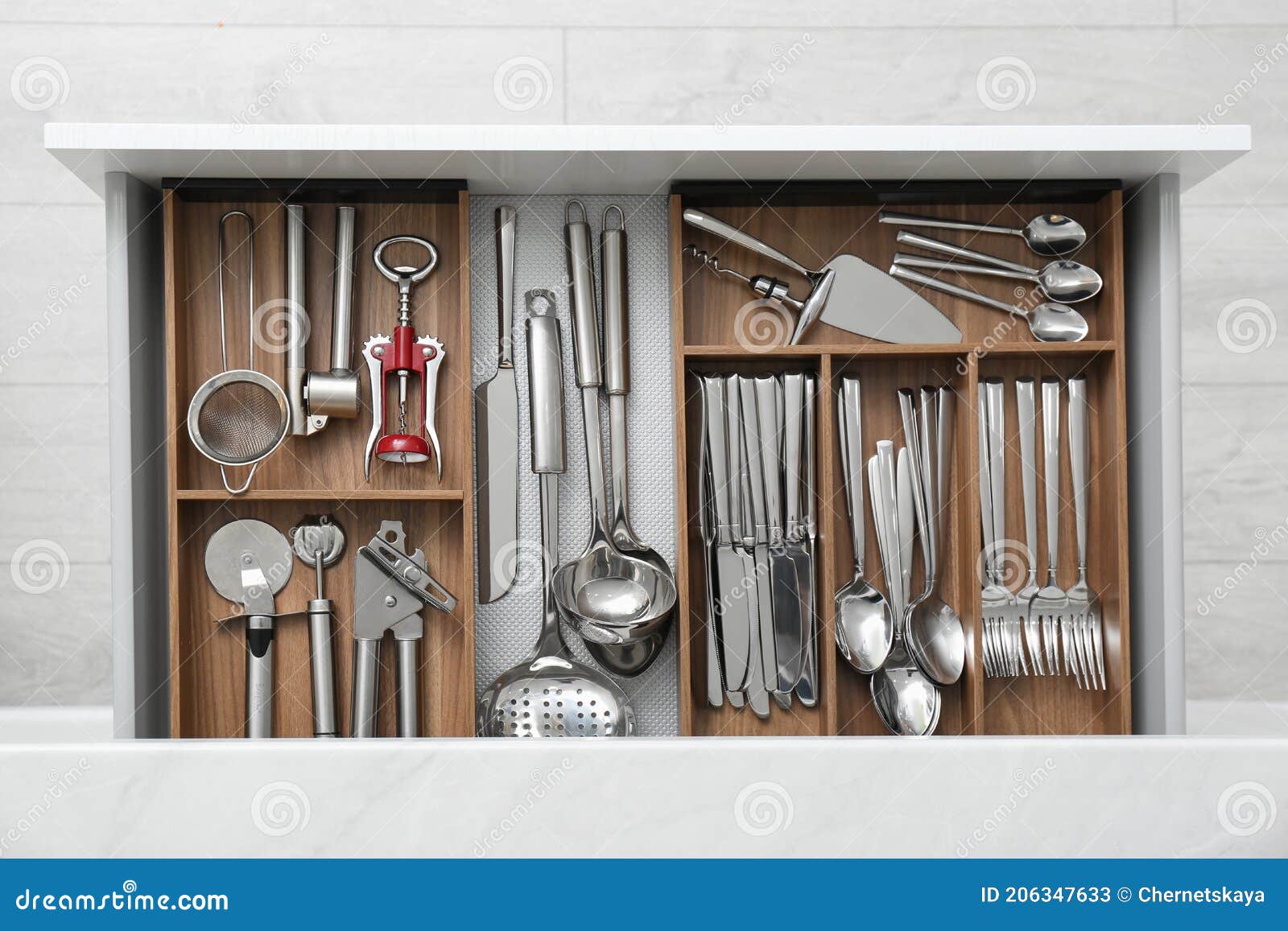 Open Drawer with Different Utensils and Cutlery in Kitchen, Top View ...