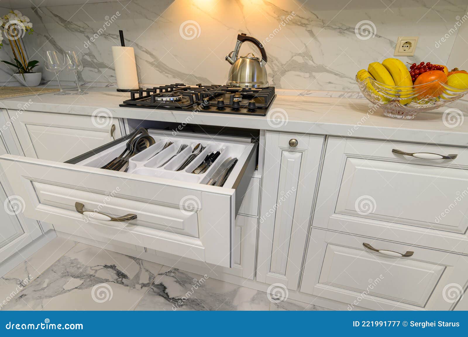 Open Drawers with Kitchenware at Modern White Kitchen Stock Image ...