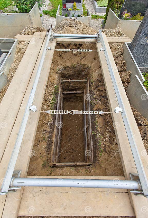 Open, Empty Grave in a Cemetery Stock Photo - Image of reflection ...