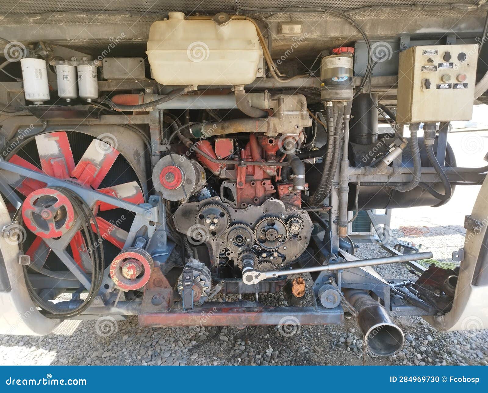 Open engine of a bus. editorial image. Image of locomotive - 284969730